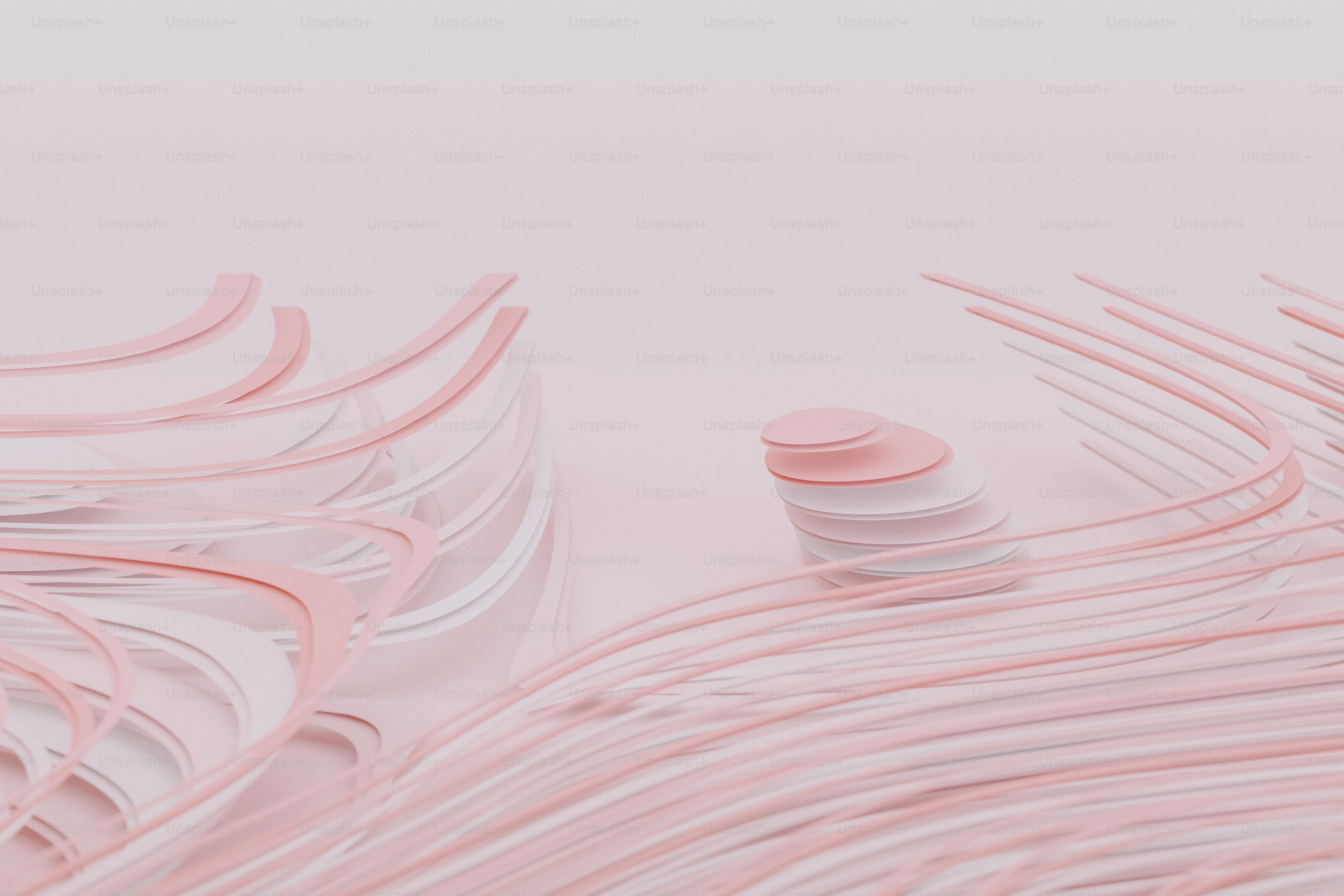 A group of pink objects sitting on top of a table photo – Abstract ...