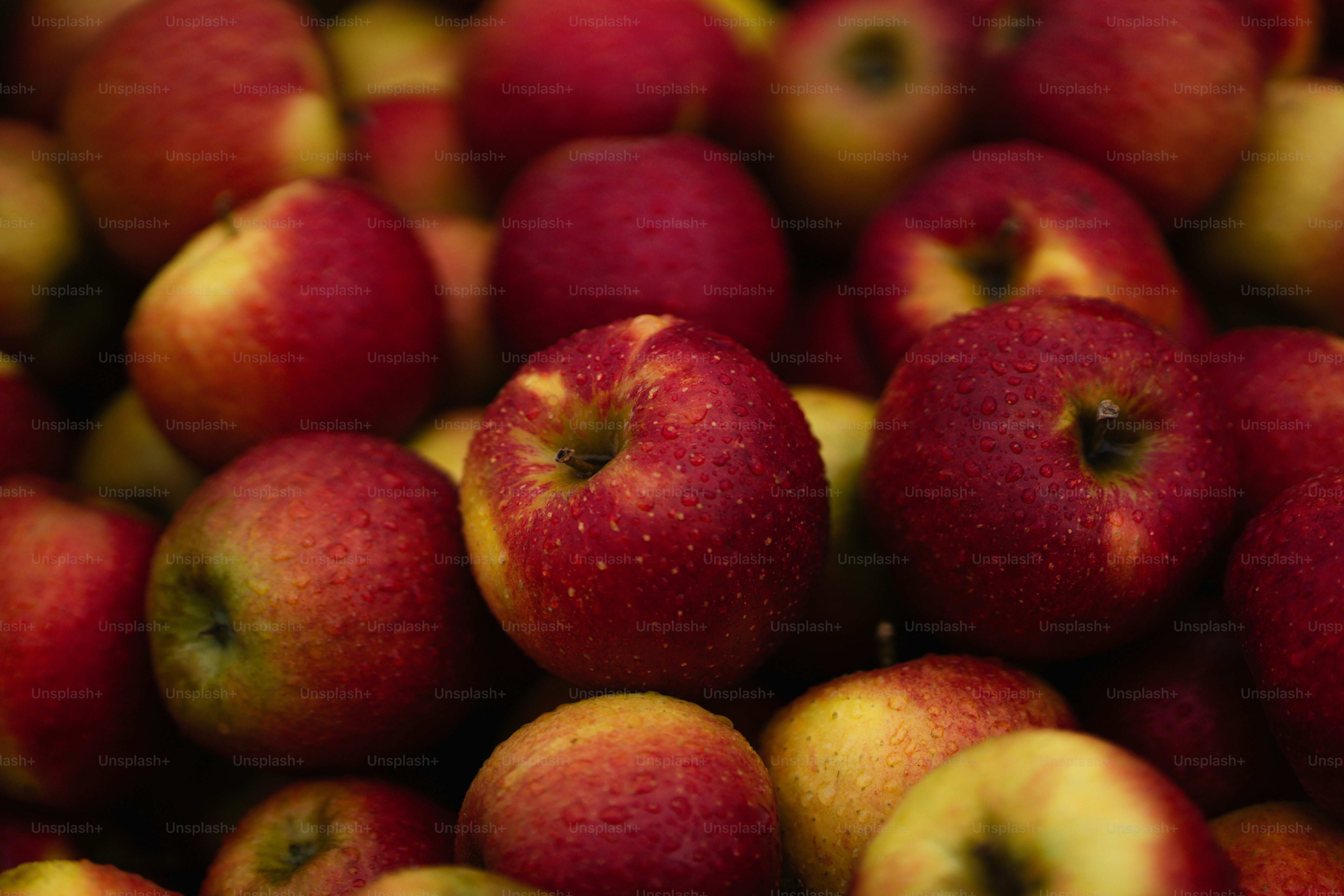 A pile of red apples sitting on top of each other photo – Apple Image ...