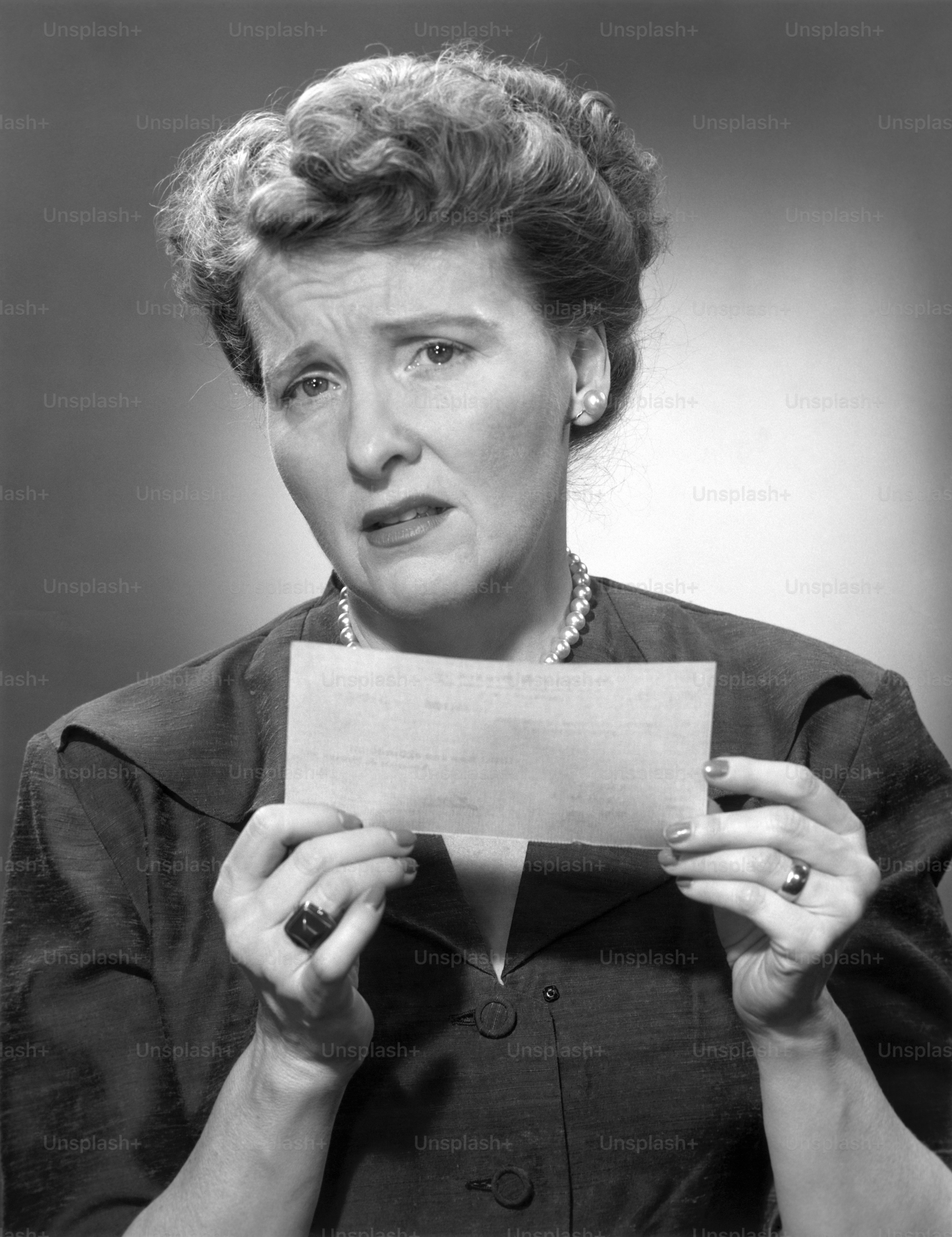 UNITED STATES - CIRCA 1950s: Mature woman holding a check. photo ...