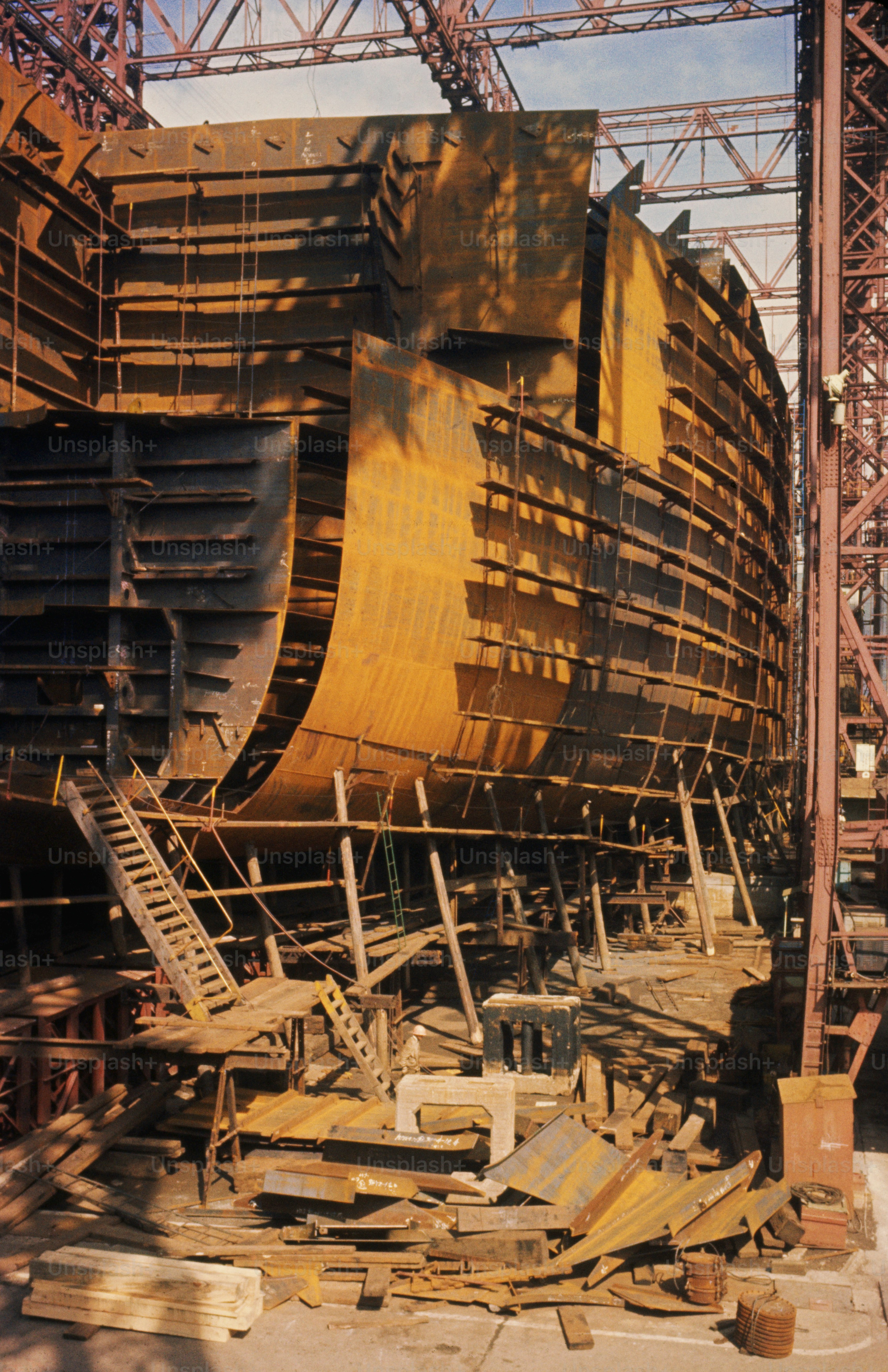 The construction of a ship held in a shipyard in Nagasaki, Japan, circa ...