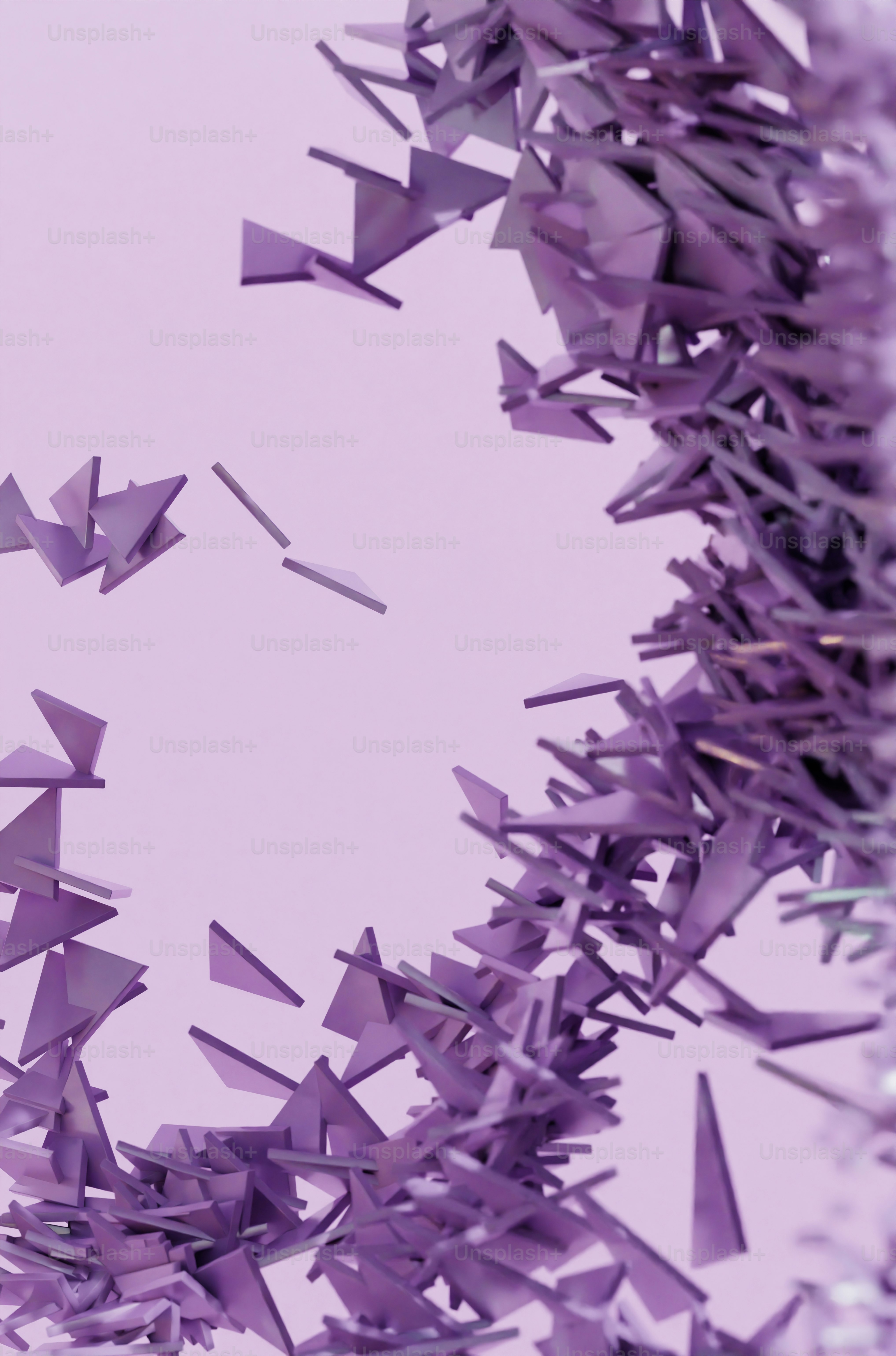 A bunch of purple confetti flying in the air photo – Wallpaper Image on ...