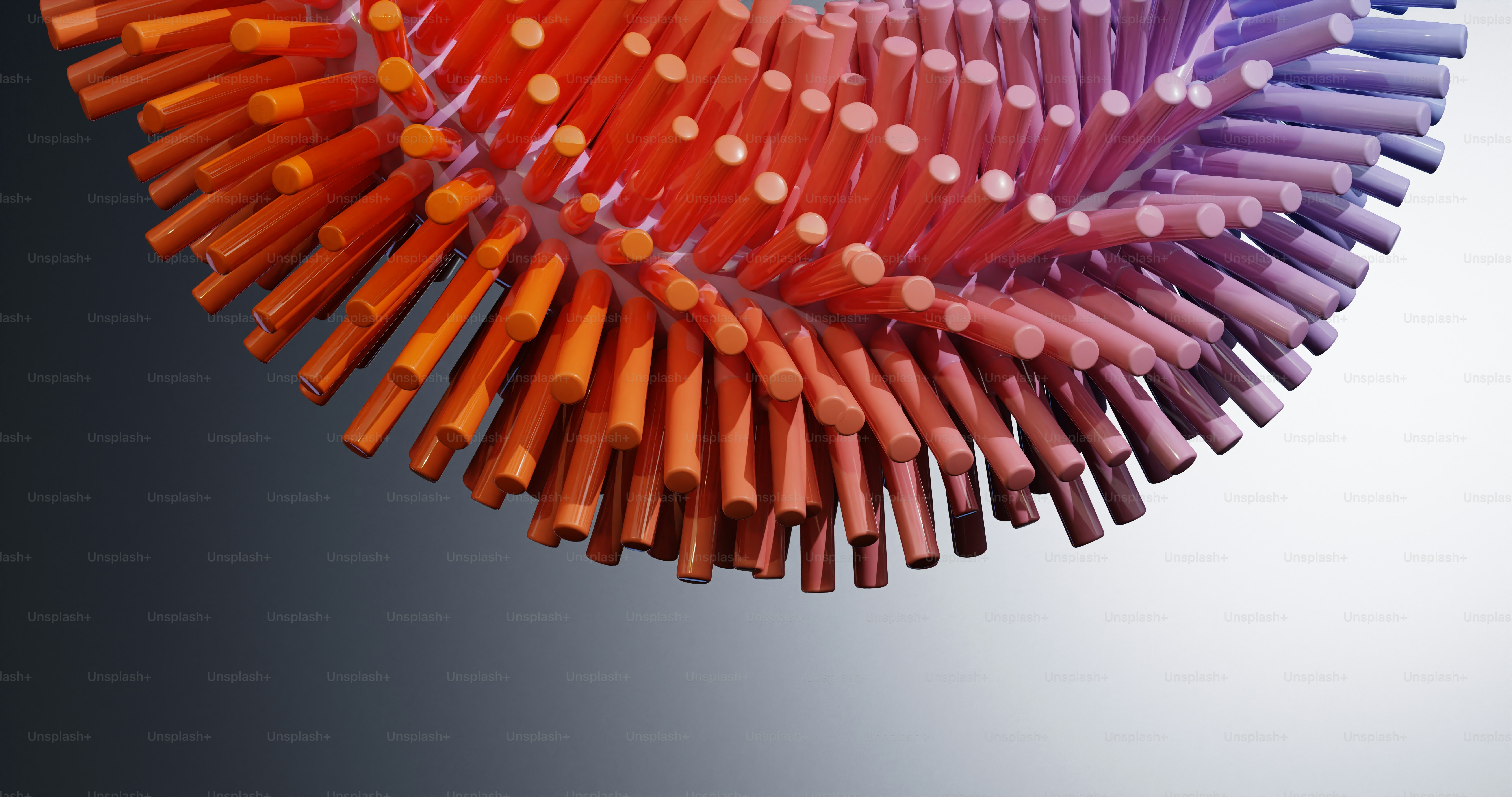 A multicolored sculpture of toothbrushes in the shape of a heart photo ...