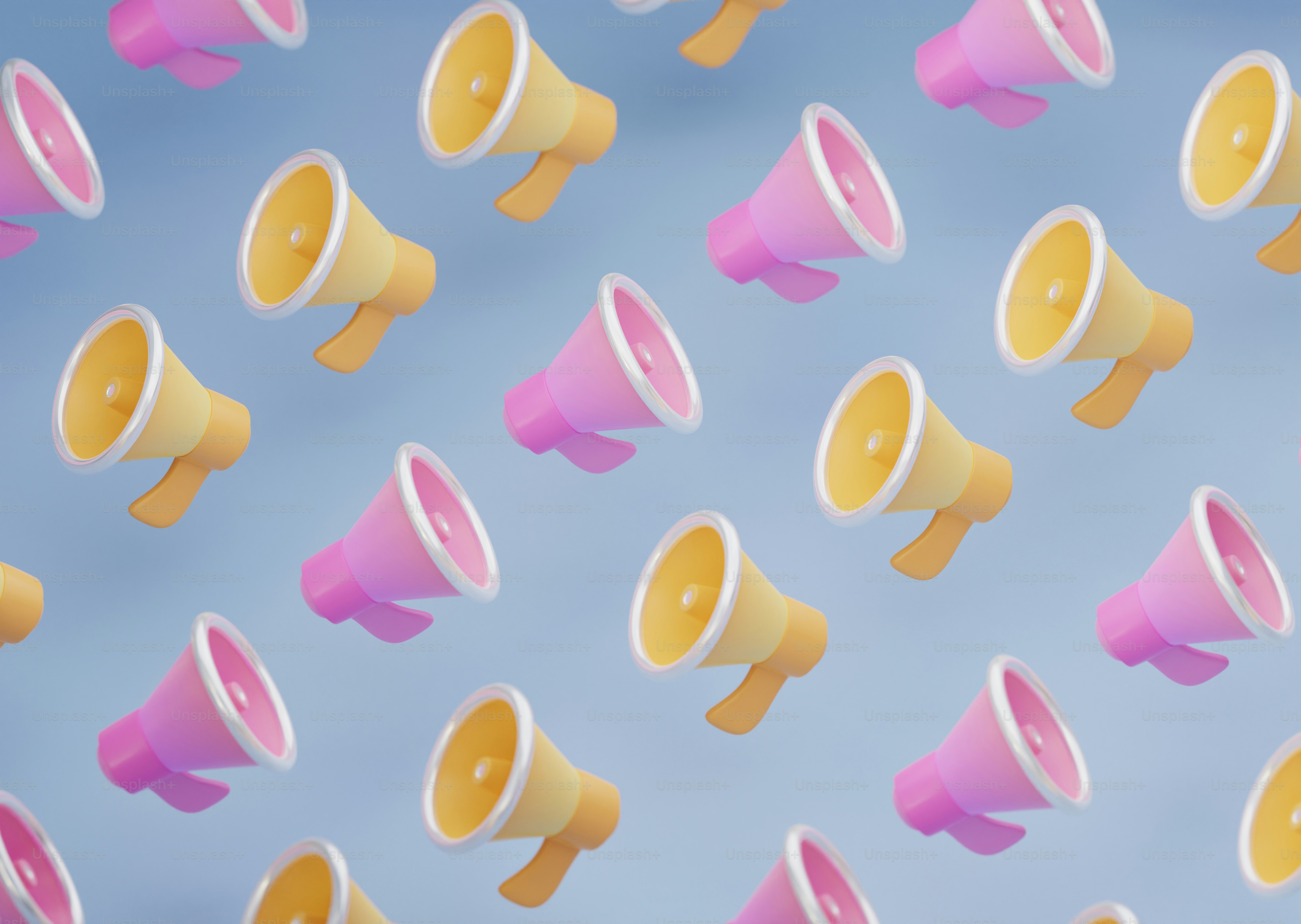 A lot of pink and yellow megaphones on a blue background photo ...