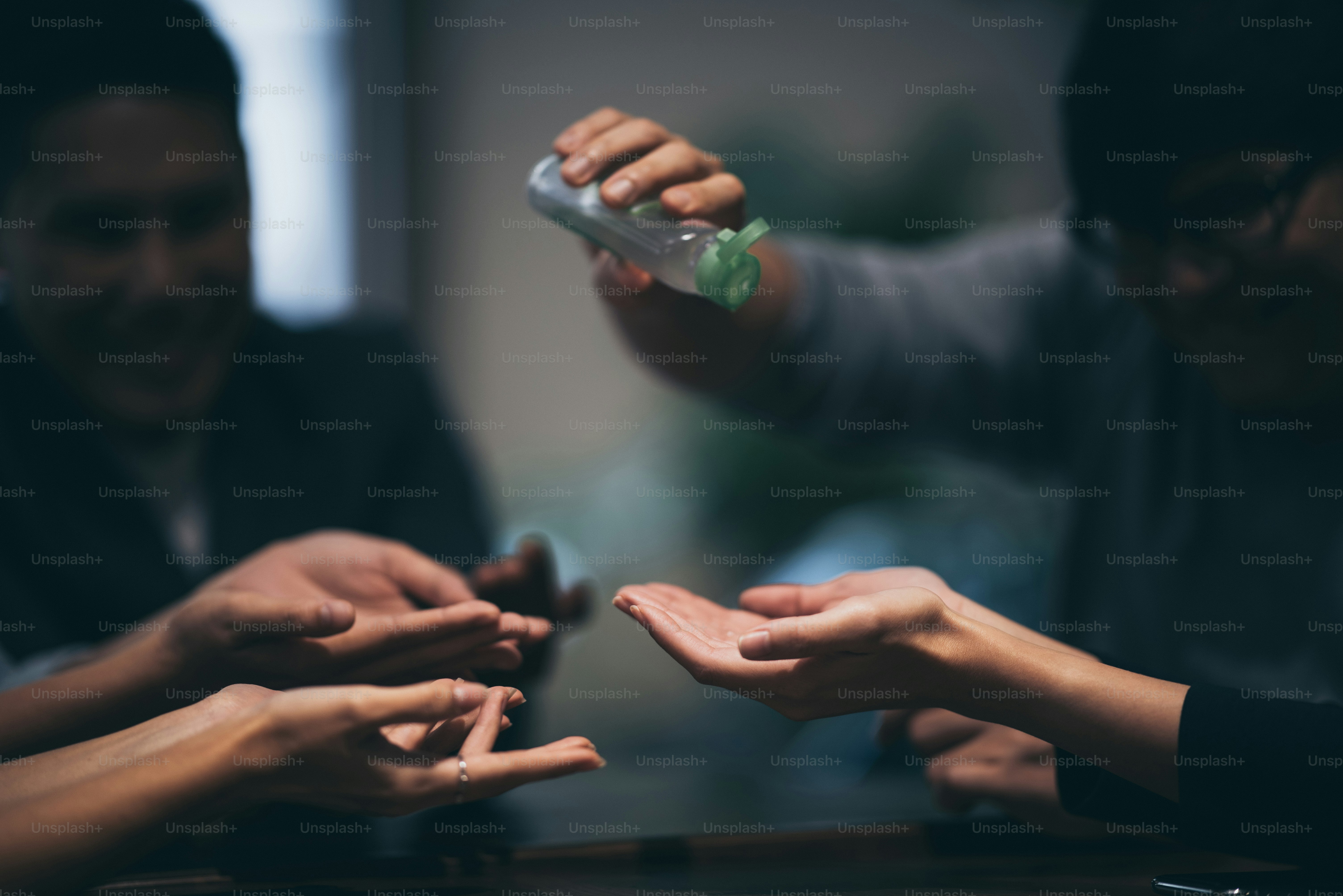 People cleaning hand with alcohol gel, covid-19 protected concept photo ...