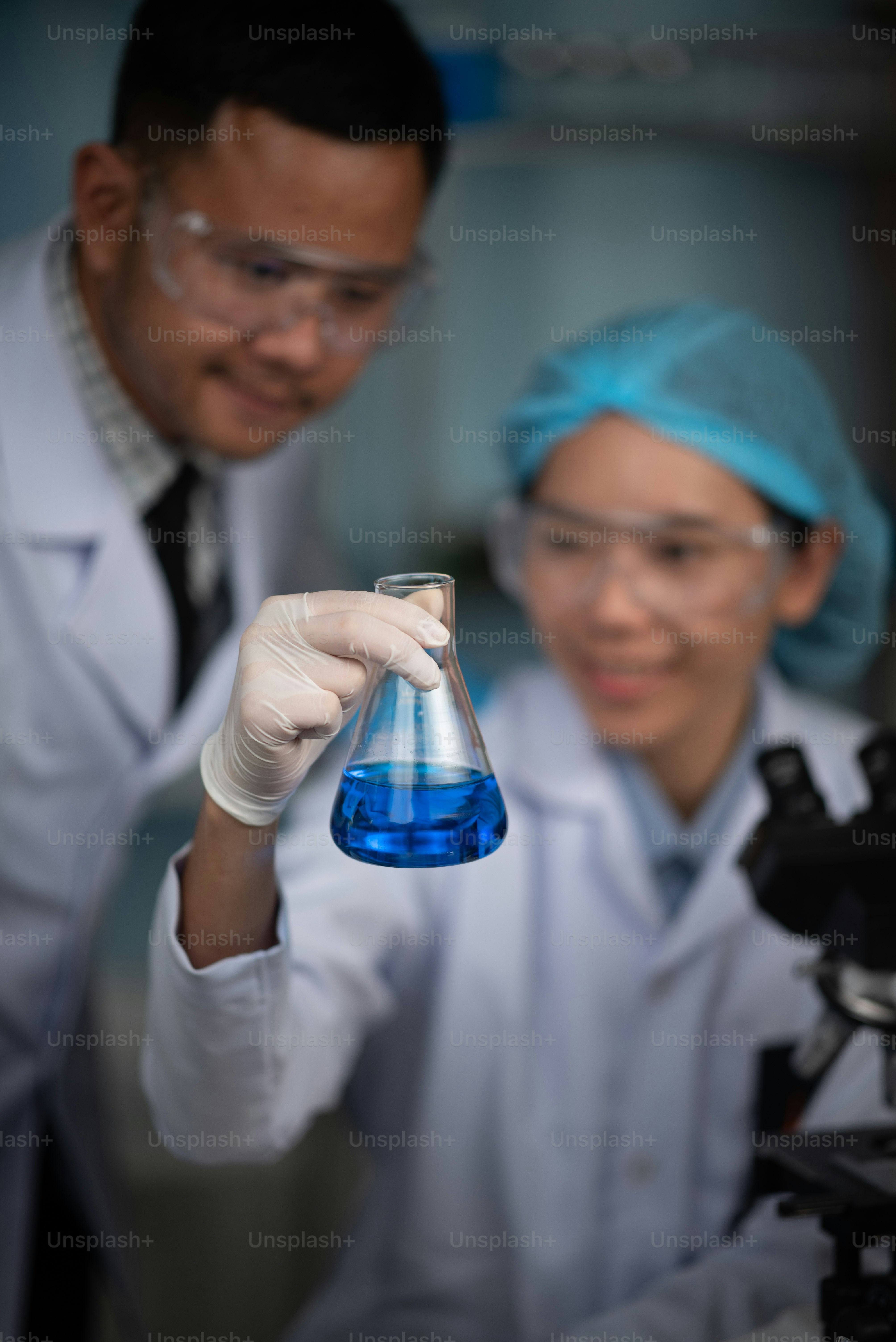 Scientific researchers team are working in the laboratory photo ...