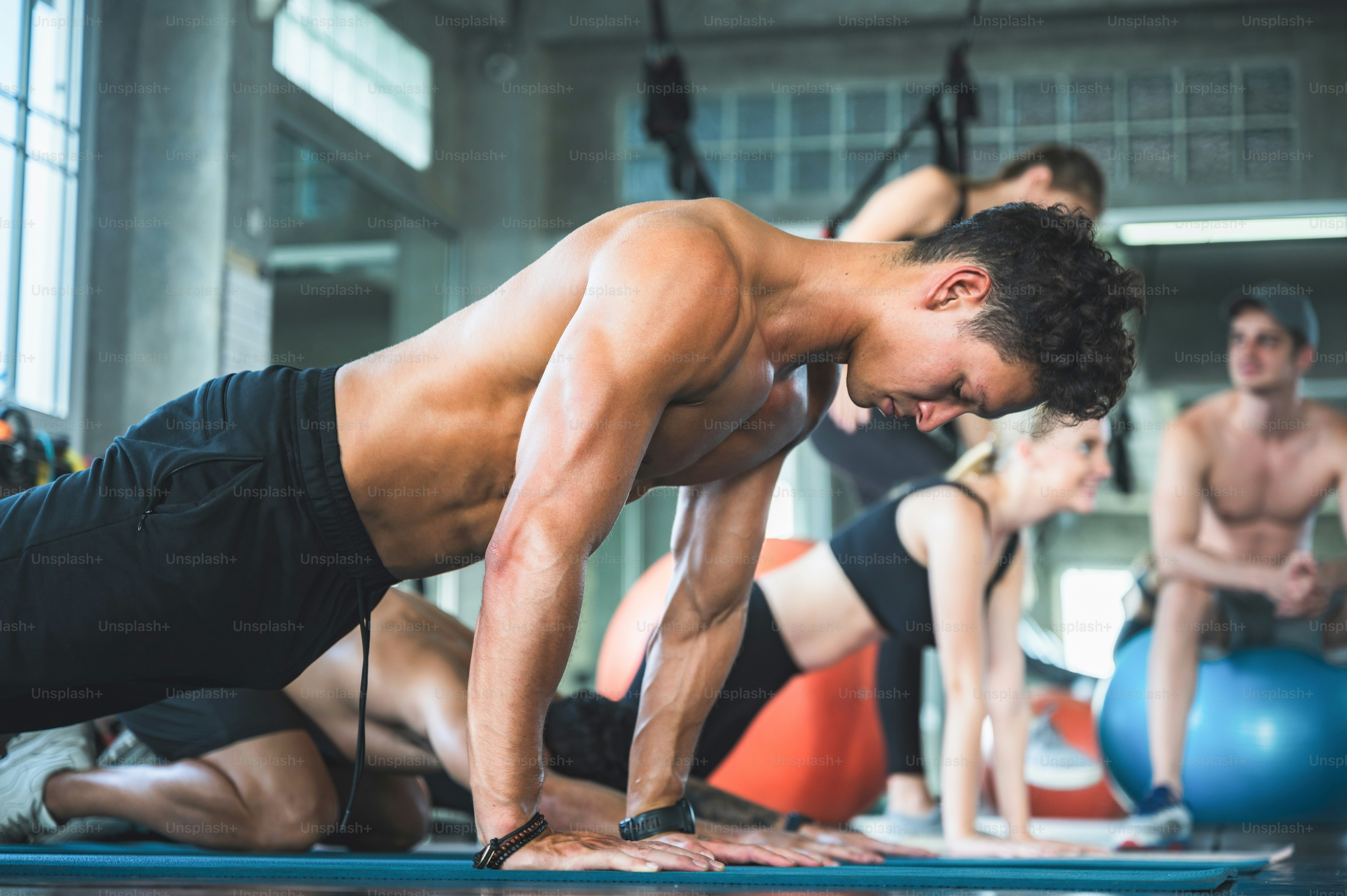 Healthy man and woman person group exercise and training in sport ...