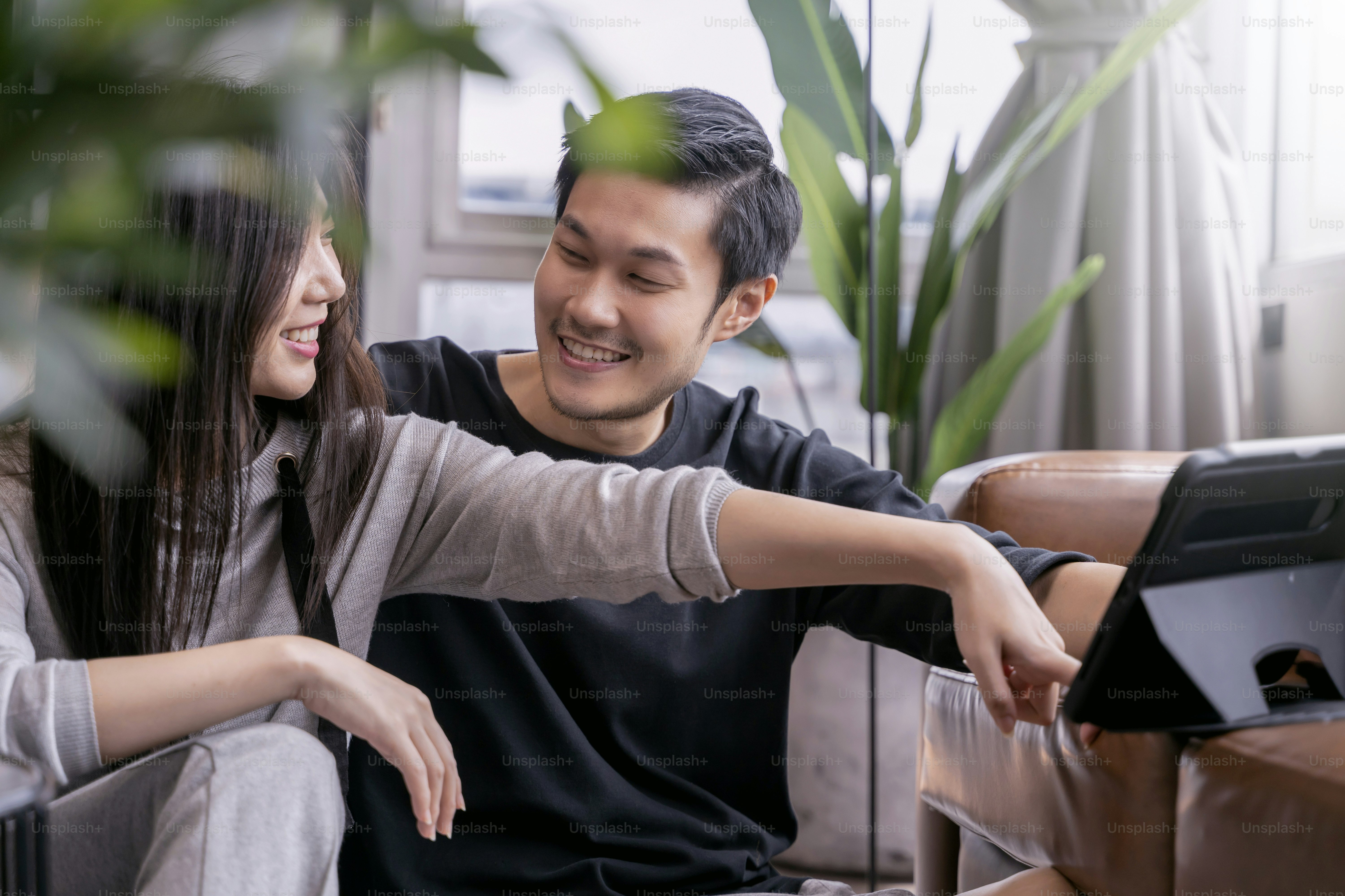 Lifestyle at home,asian female stay home together with her husband ...