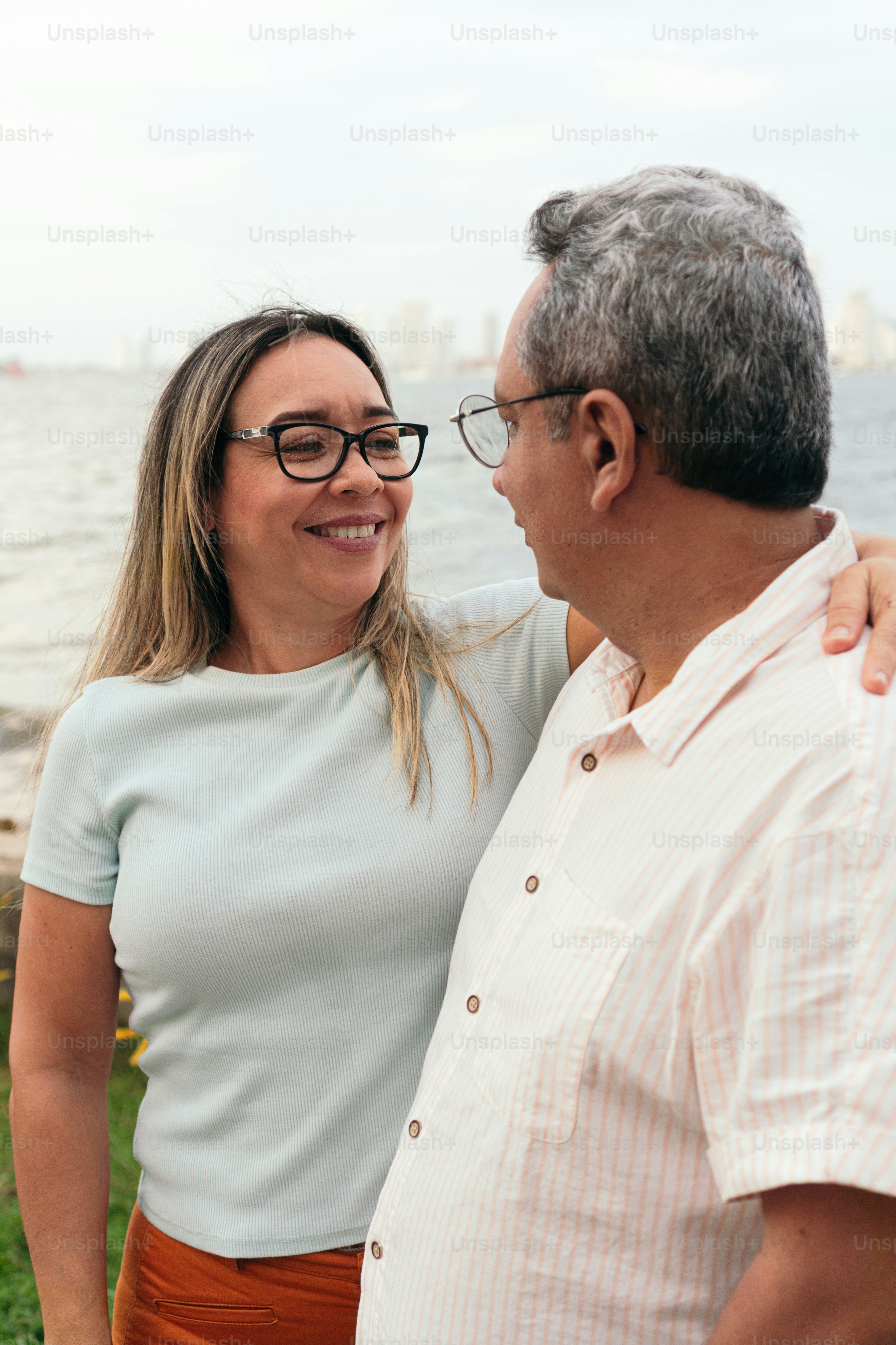 50 Year Old Couple Standing In A Park Photo Joy Image On Unsplash