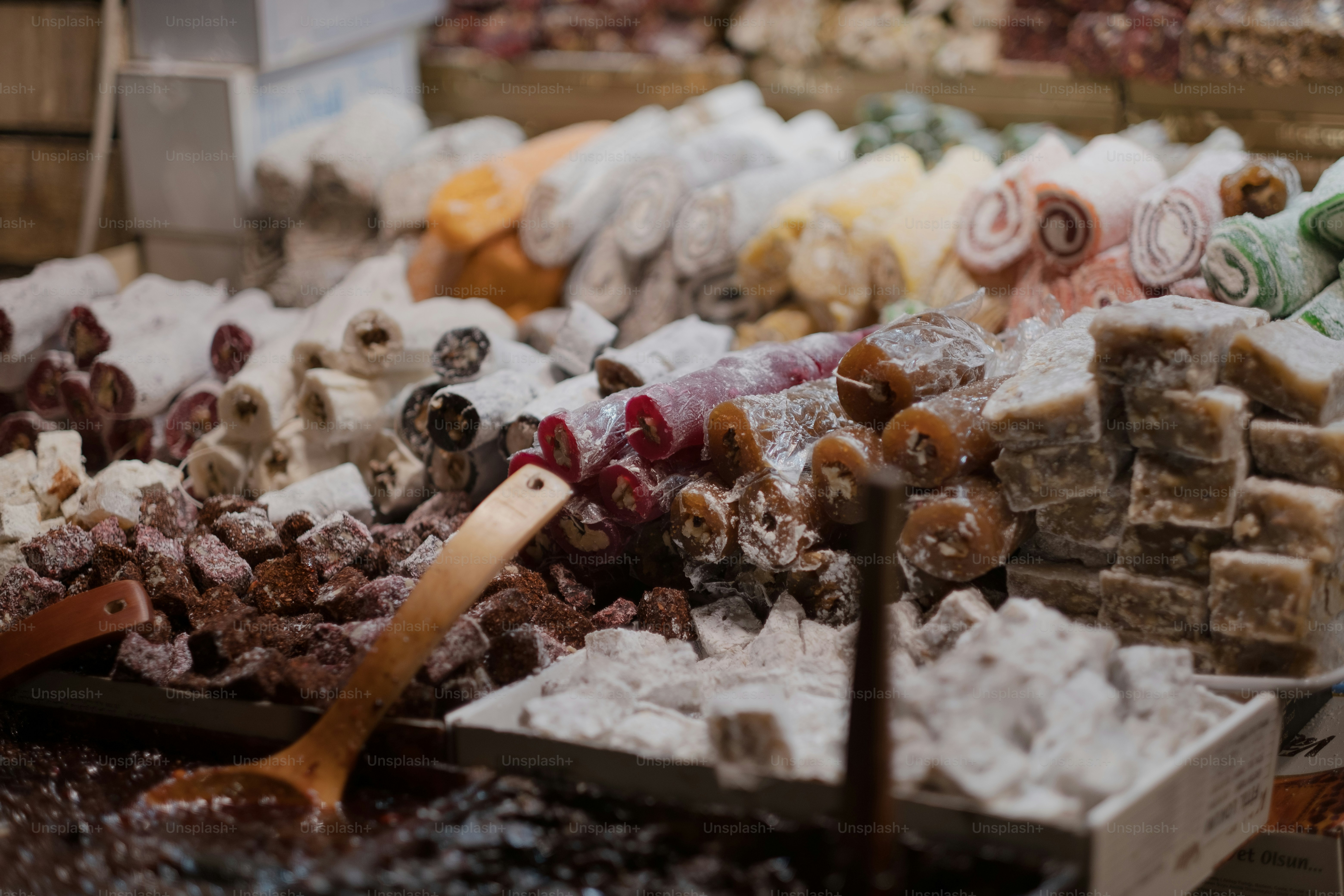 A table filled with lots of different types of candy photo – Churchela ...