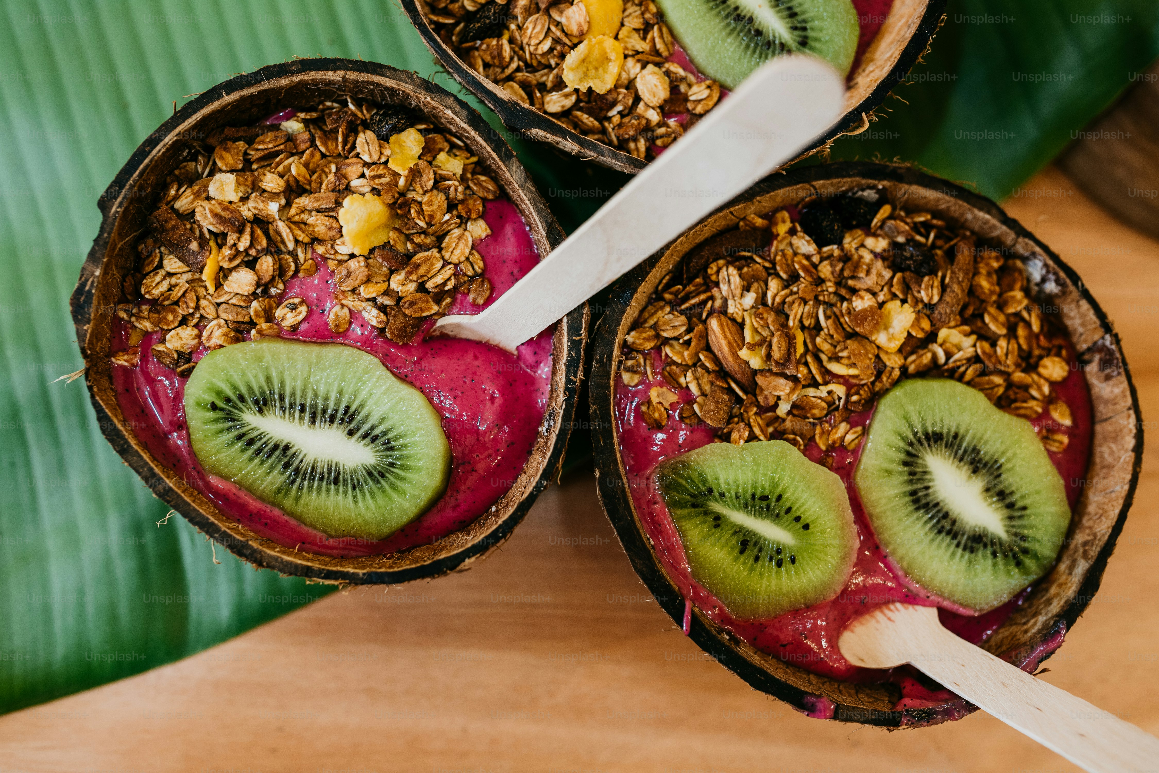 A couple of cups filled with fruit on top of a table photo – Food and ...