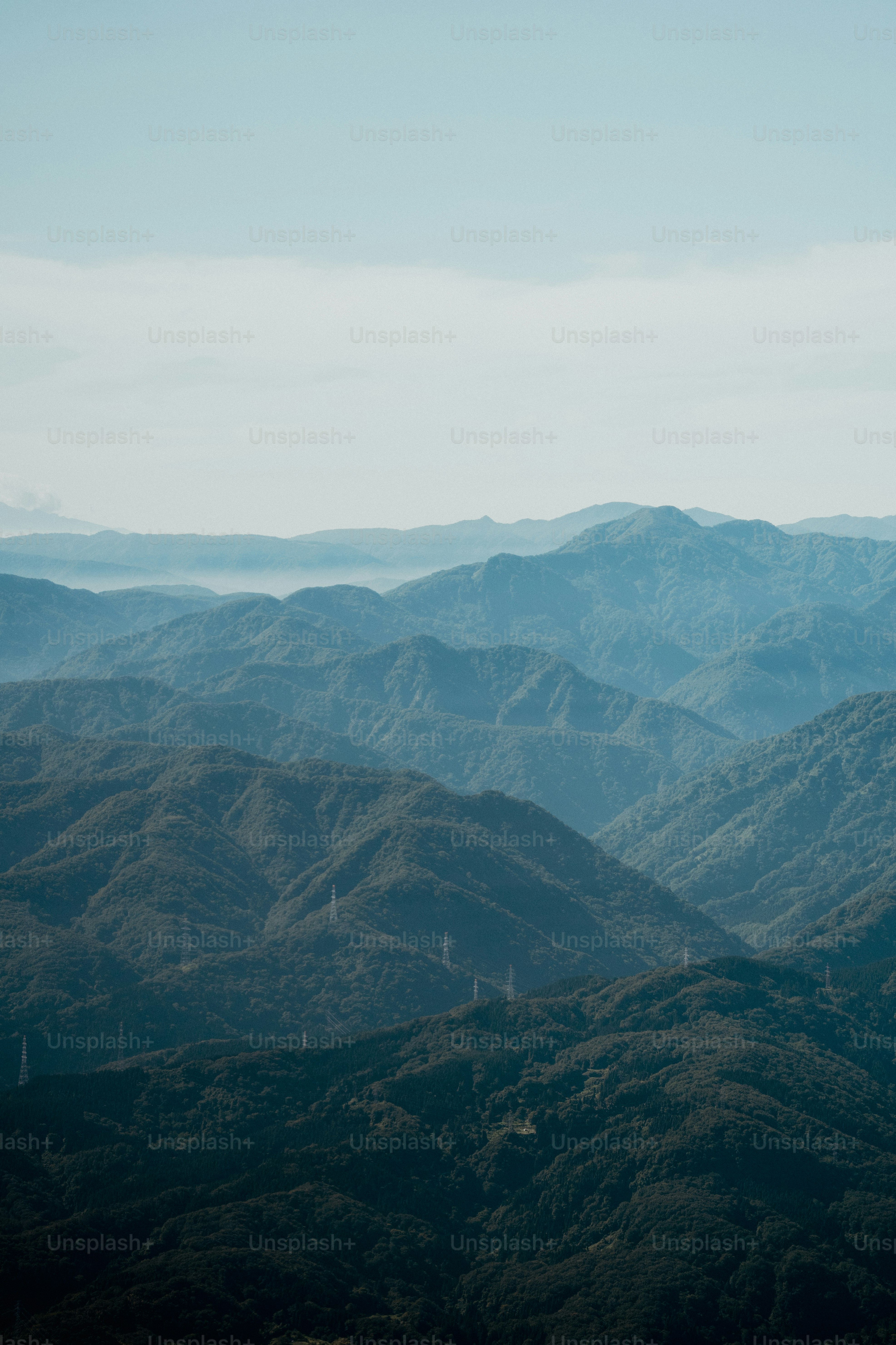 An aerial view of a snow covered mountain range photo – Japan Image on ...
