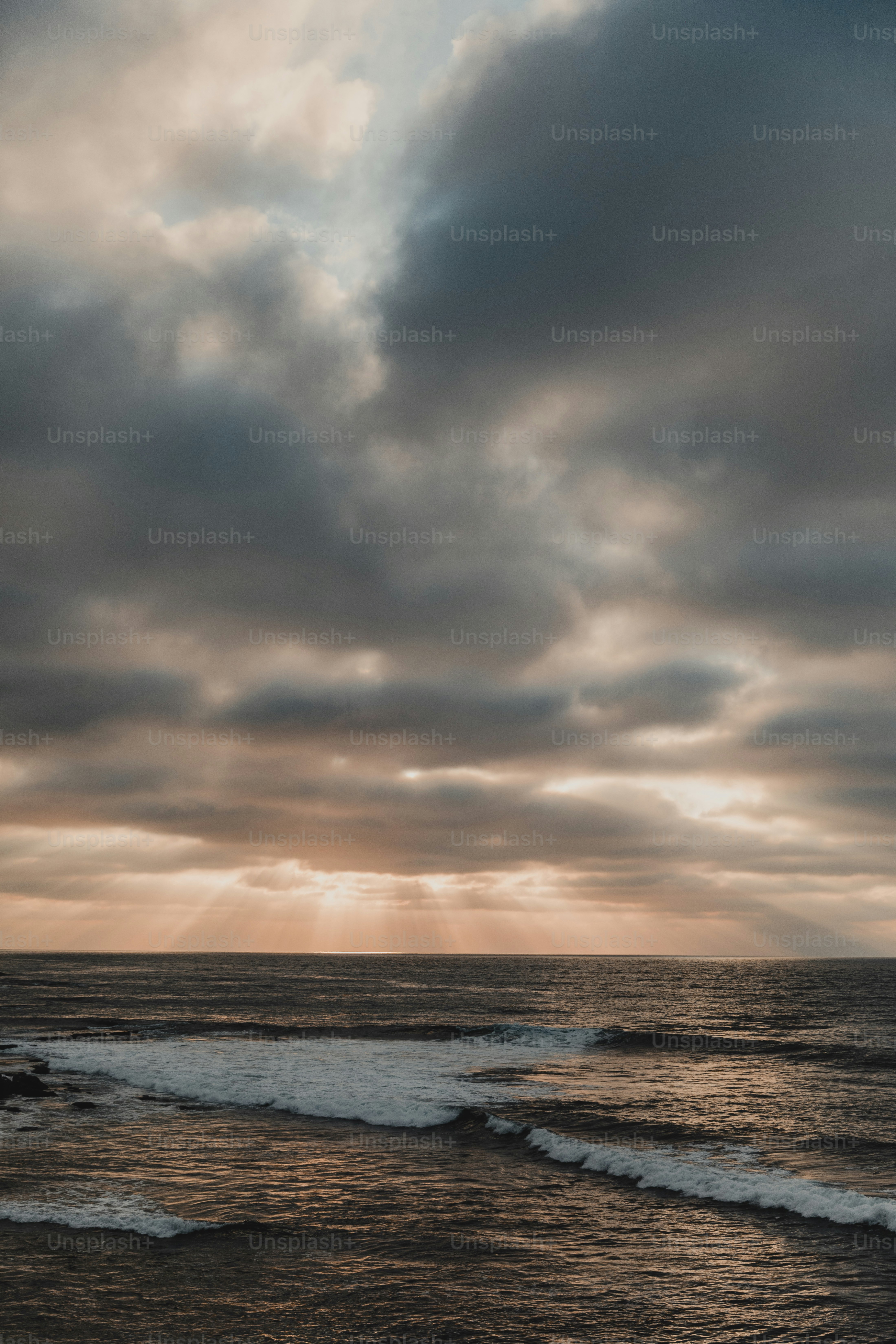 A large body of water under a cloudy sky photo – Dramatic sky Image on ...