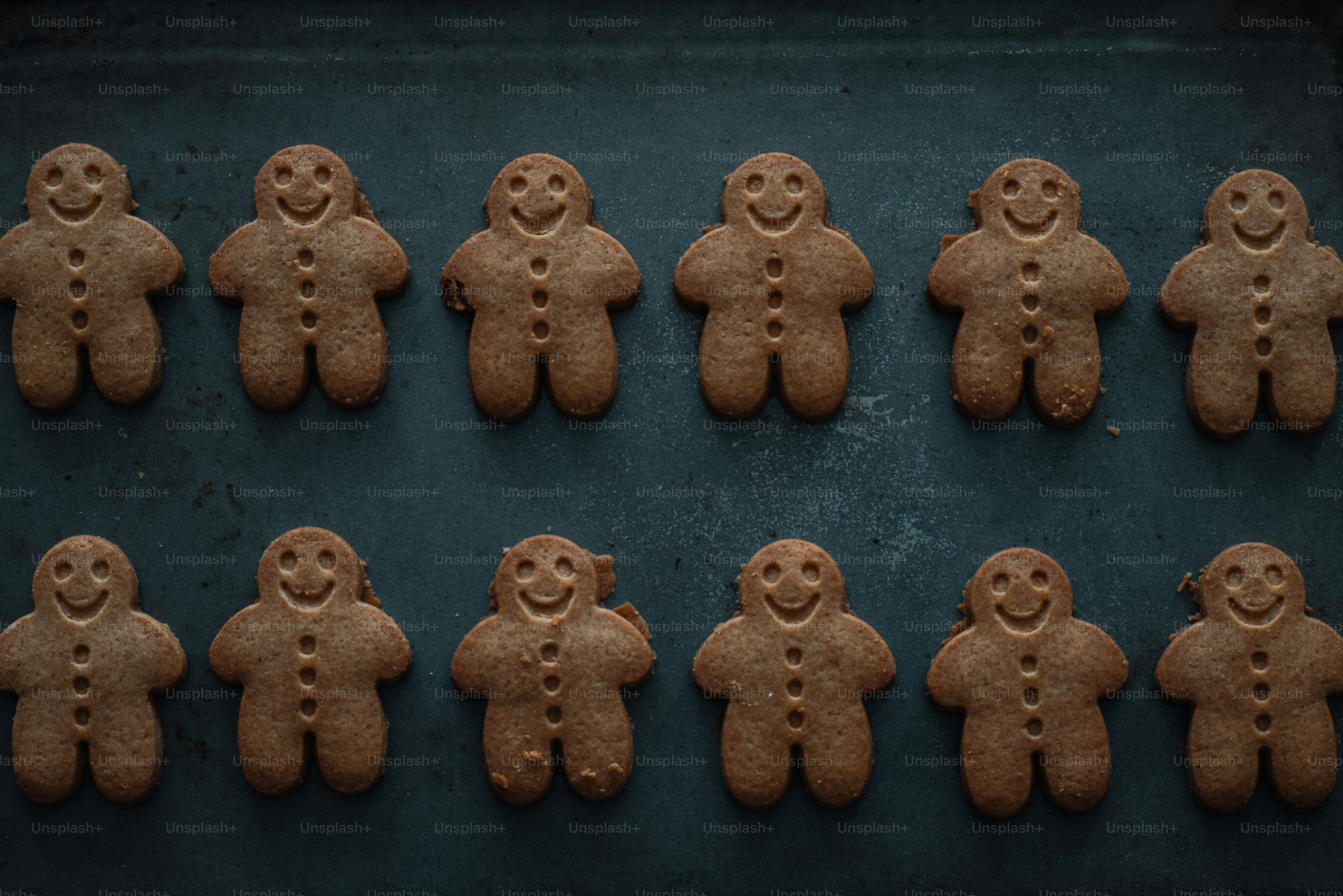 A bunch of cookies that are shaped like people photo – Christmas Image ...