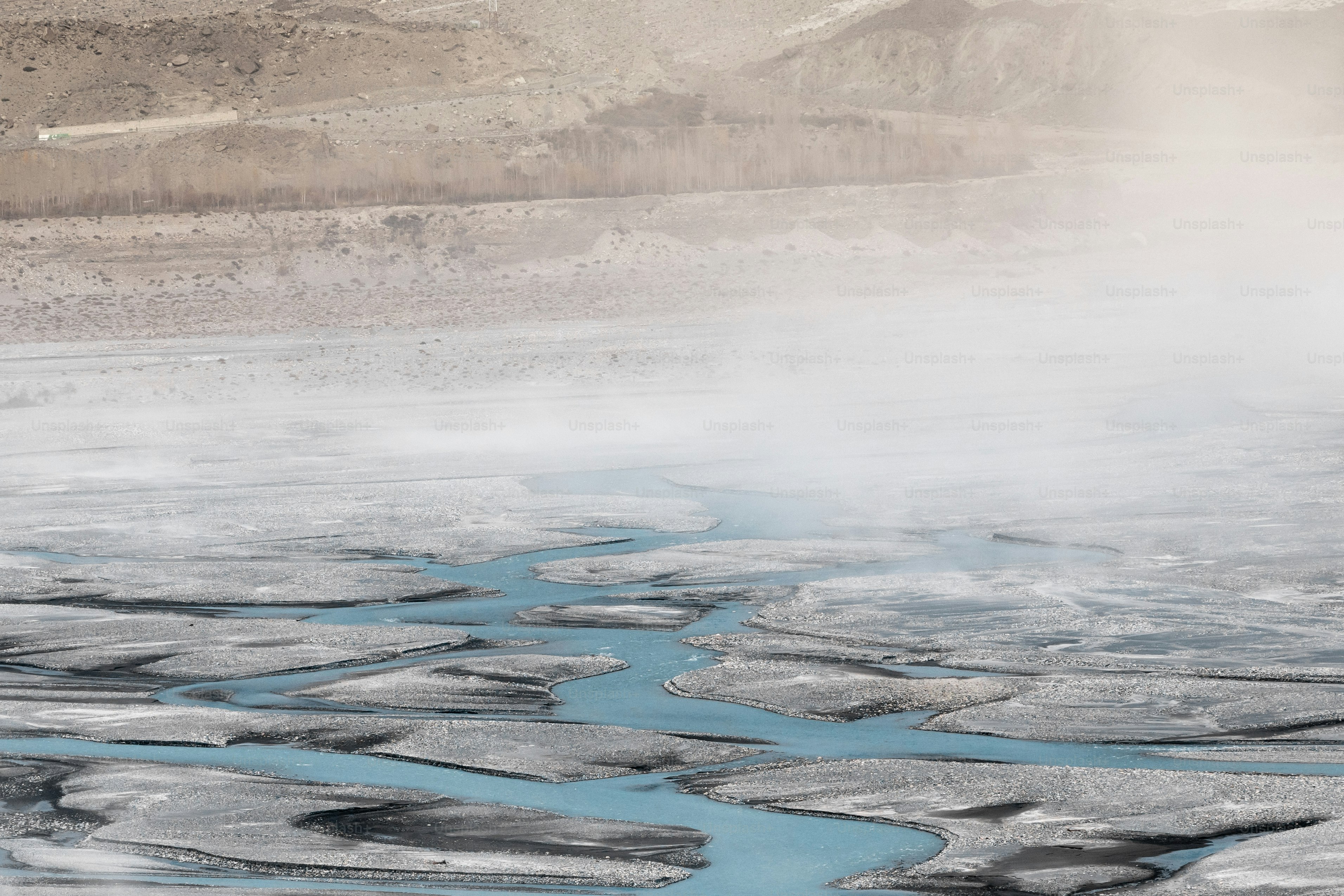 A body of water with steam rising from it photo – Steam Image on Unsplash