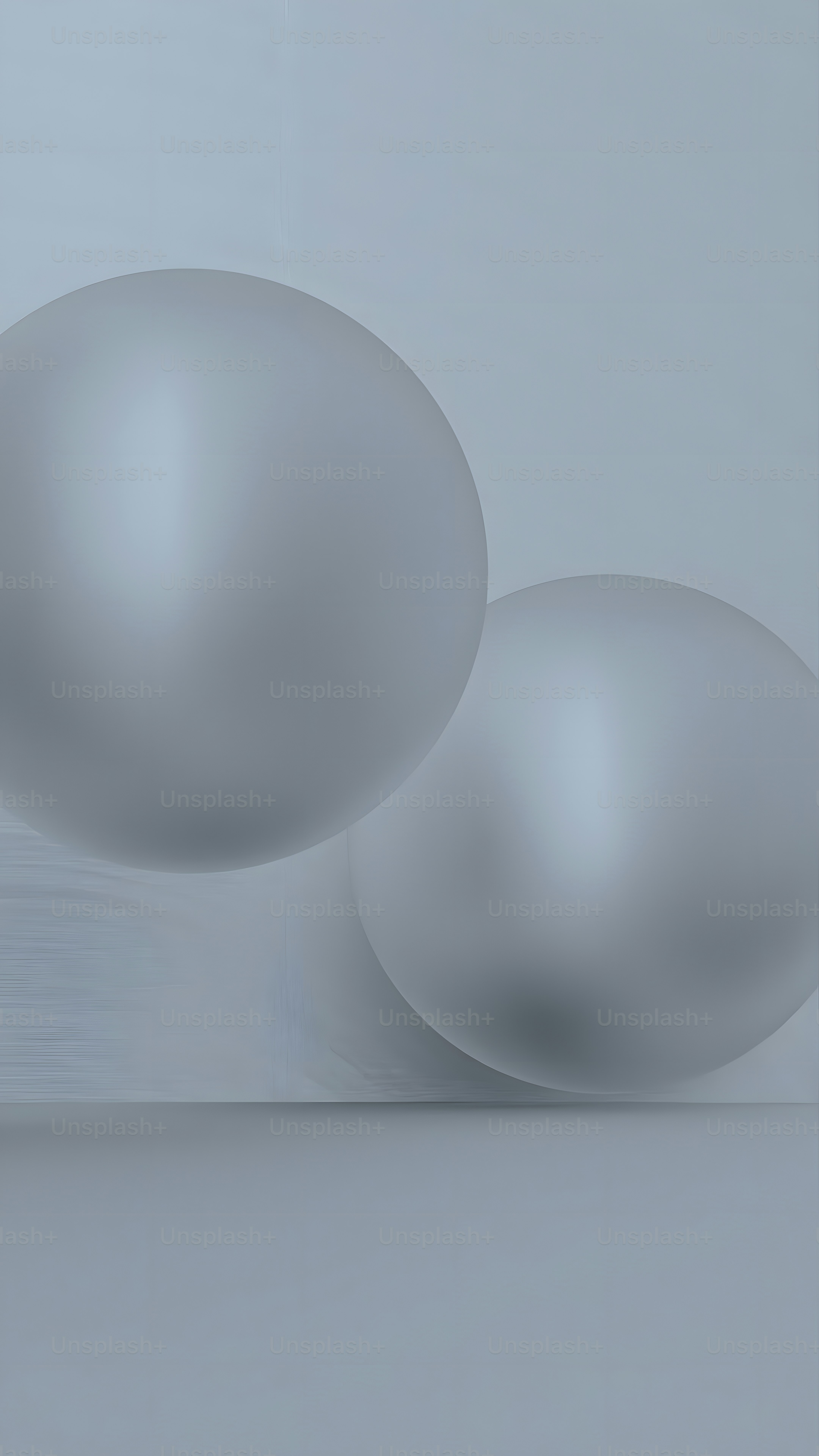 Two white balls sitting on top of a table photo – Backgrounds Image on ...