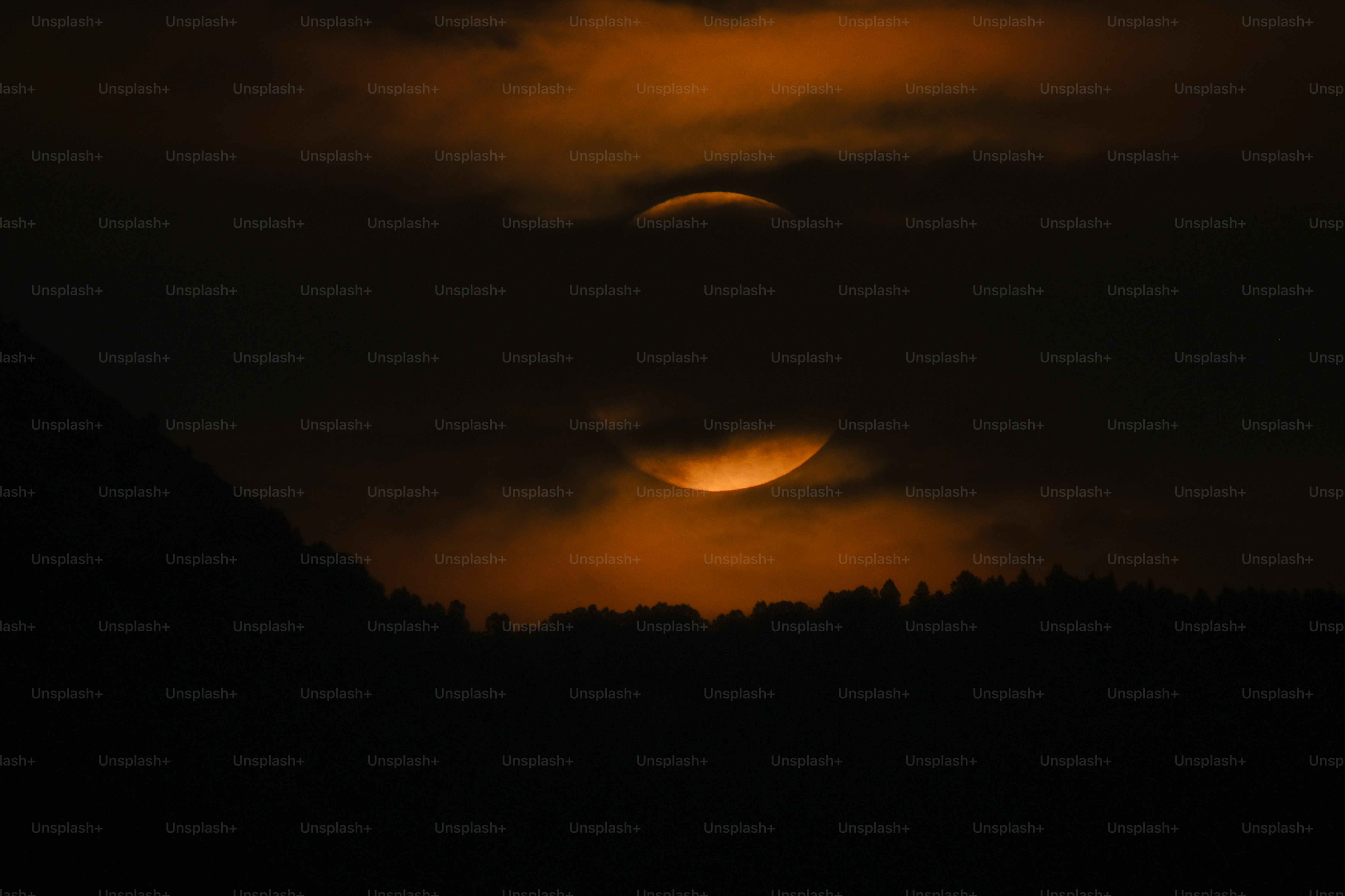 The eclipse of the moon during a partial solar eclipse photo – Eclipse ...