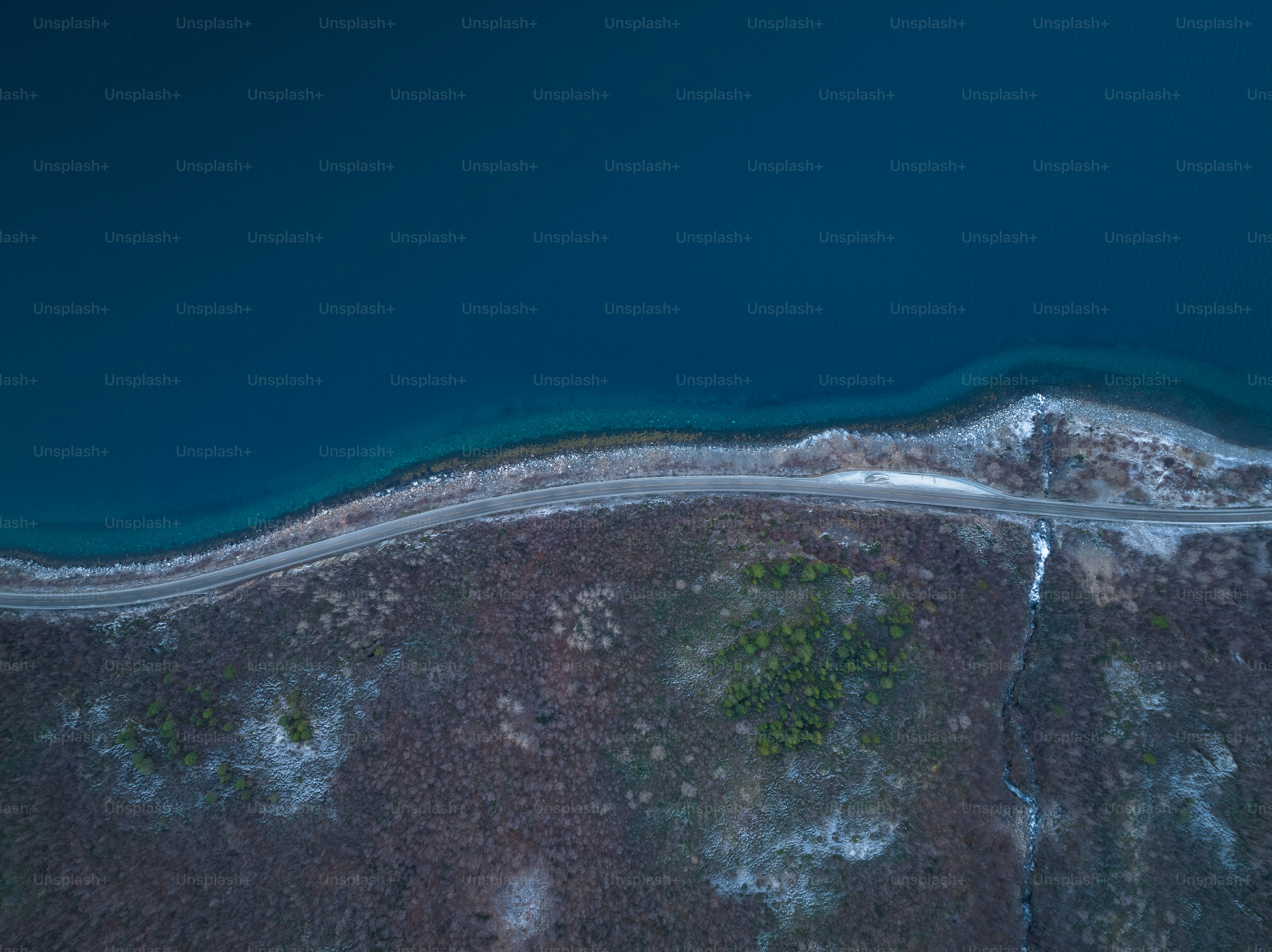 An aerial view of a body of water photo – Aerial view Image on Unsplash