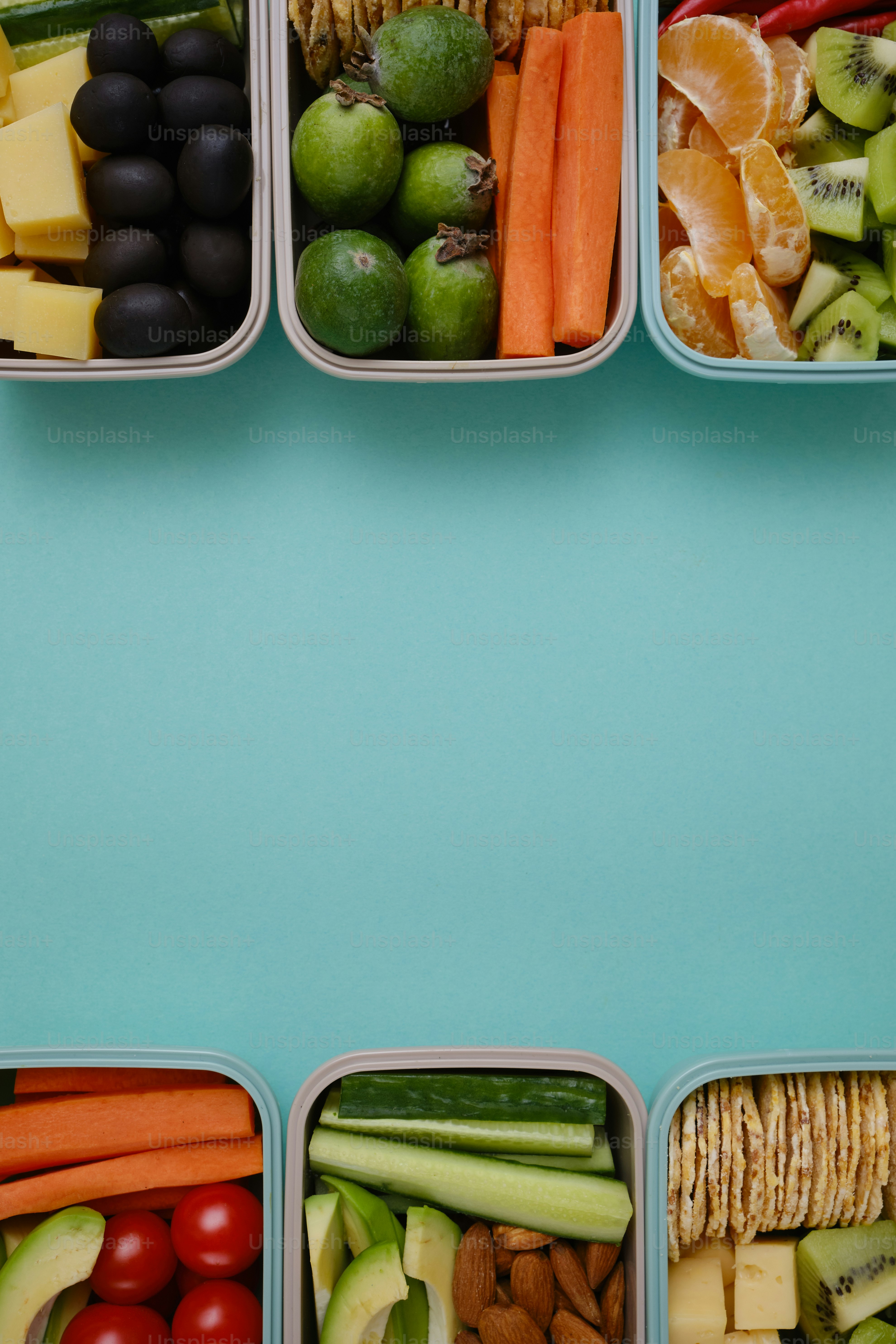 A set of four tins filled with different types of food photo – Lunch ...