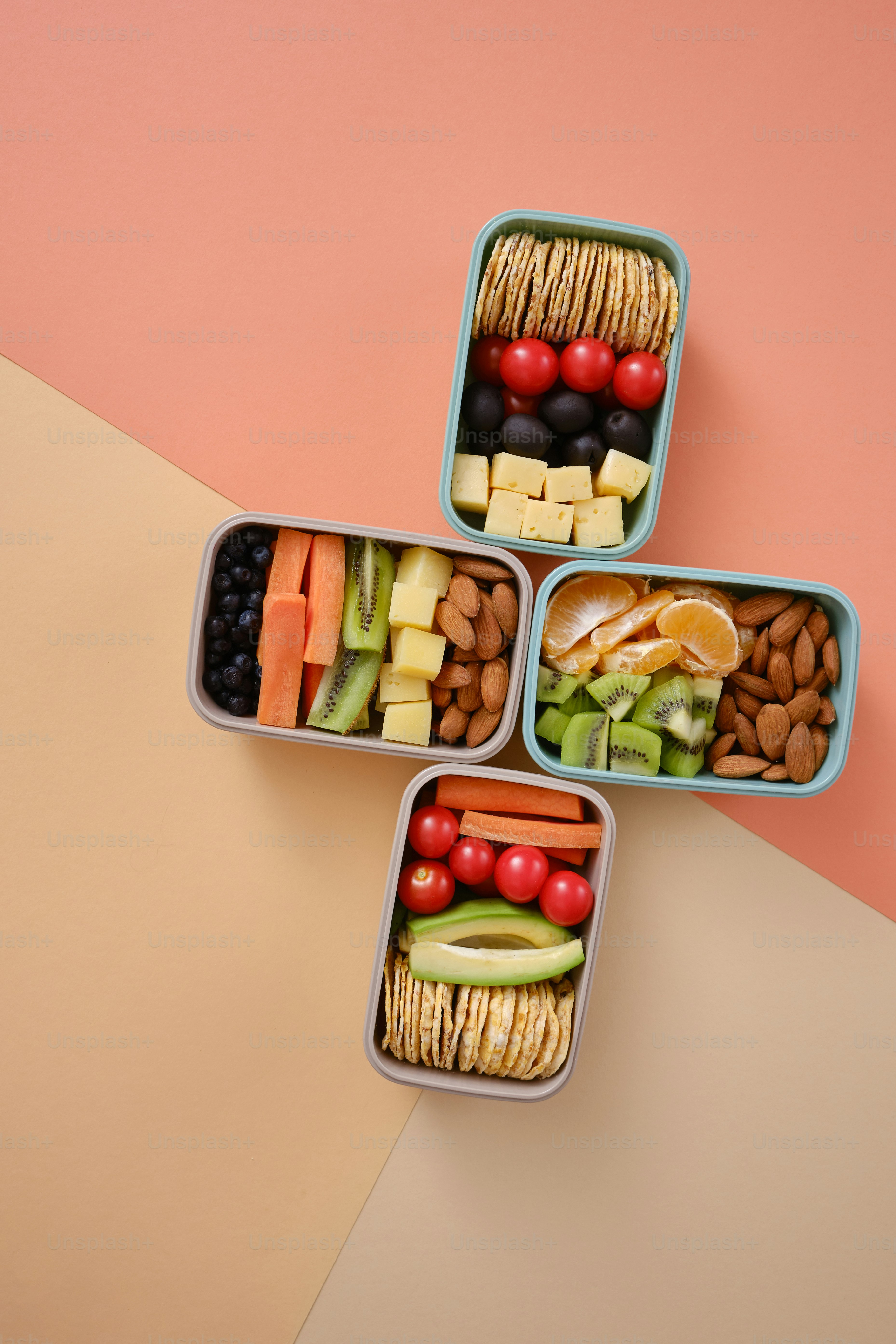 A group of four containers filled with different types of food photo ...