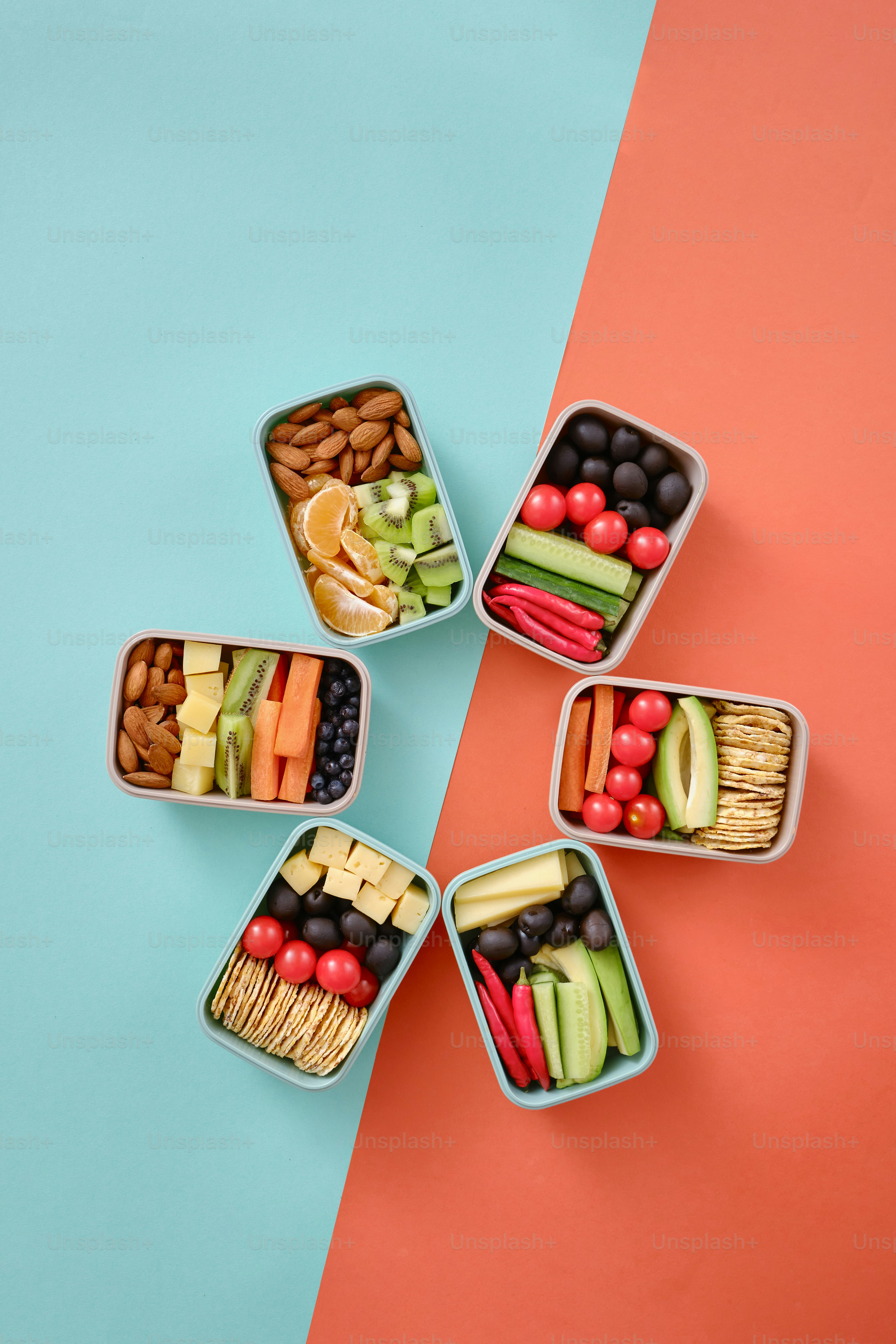 Four plastic containers filled with different types of food photo ...