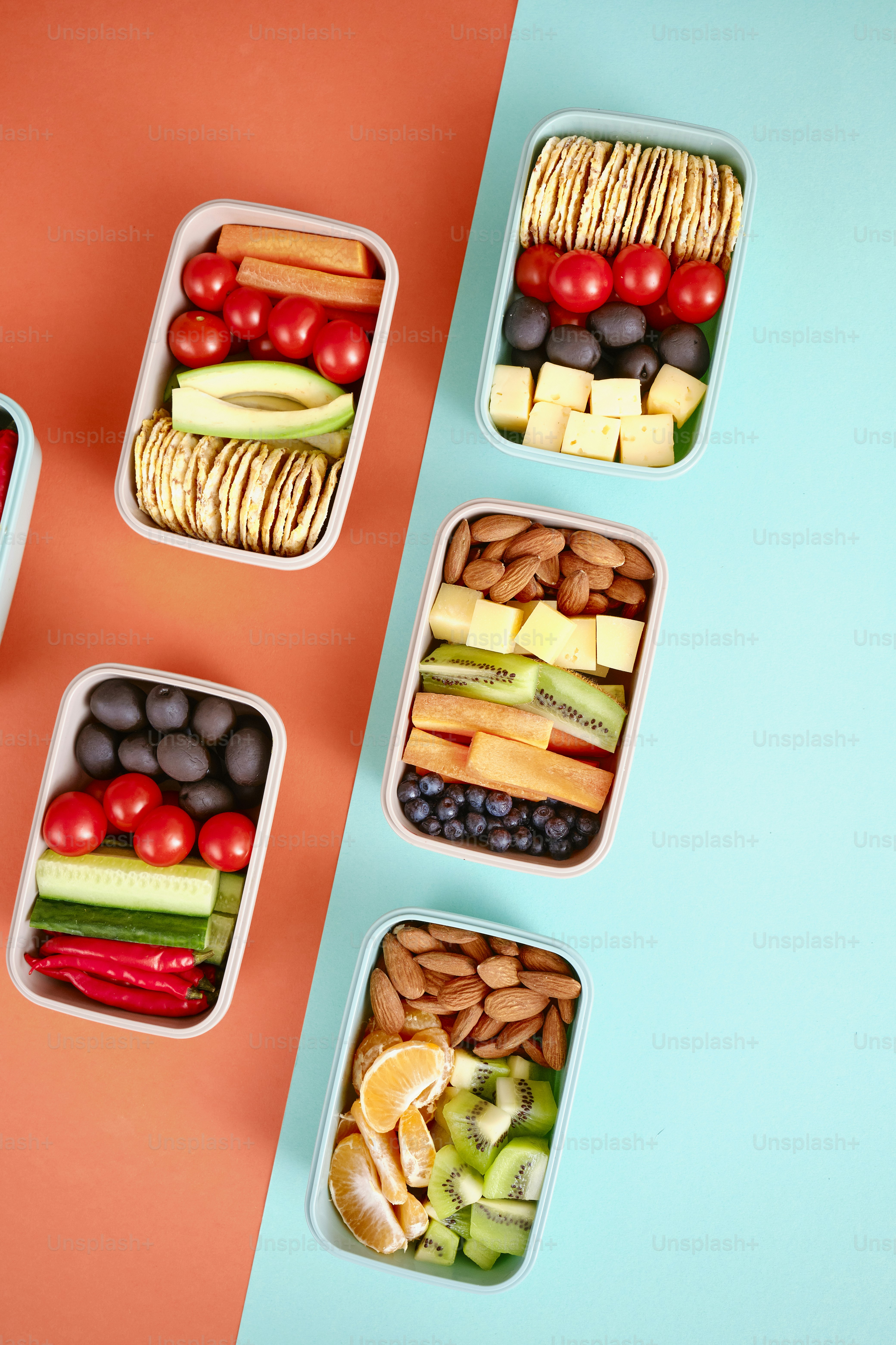 A group of containers filled with different types of food photo ...