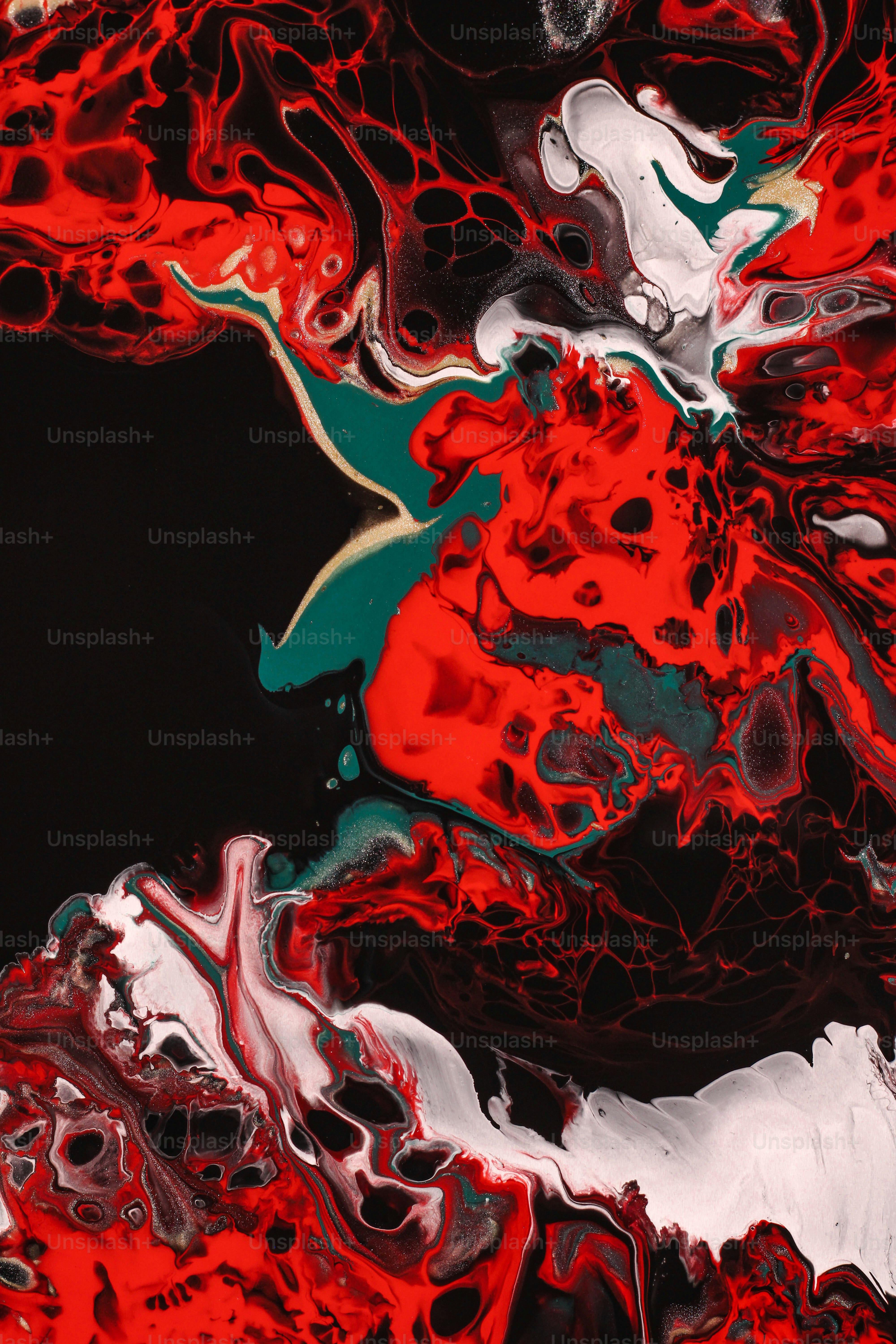 Une peinture abstraite rouge et noir sur fond noir photo – Motif Photo ...