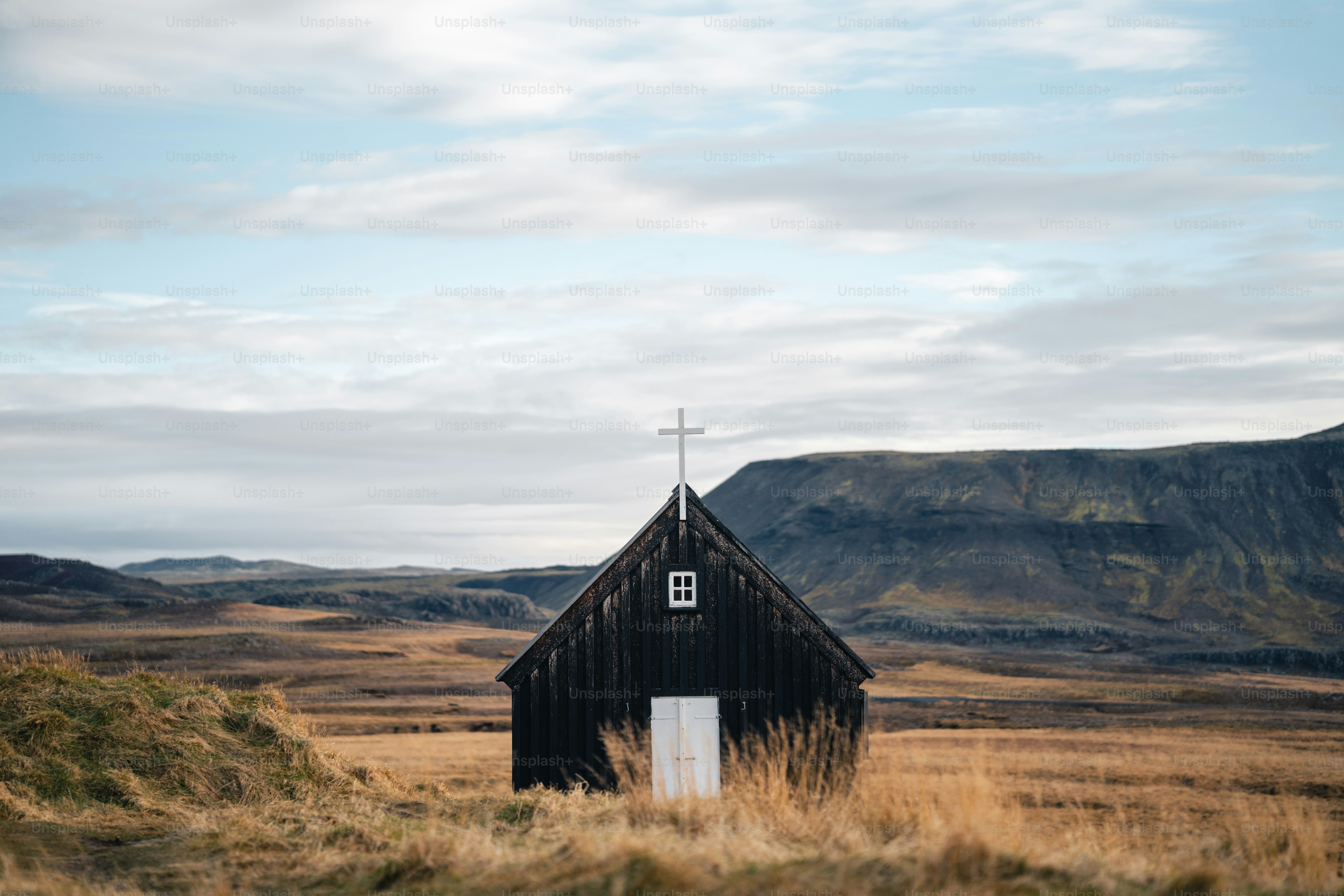 A black church with a cross on top of it photo – Post apocalyptic Image ...