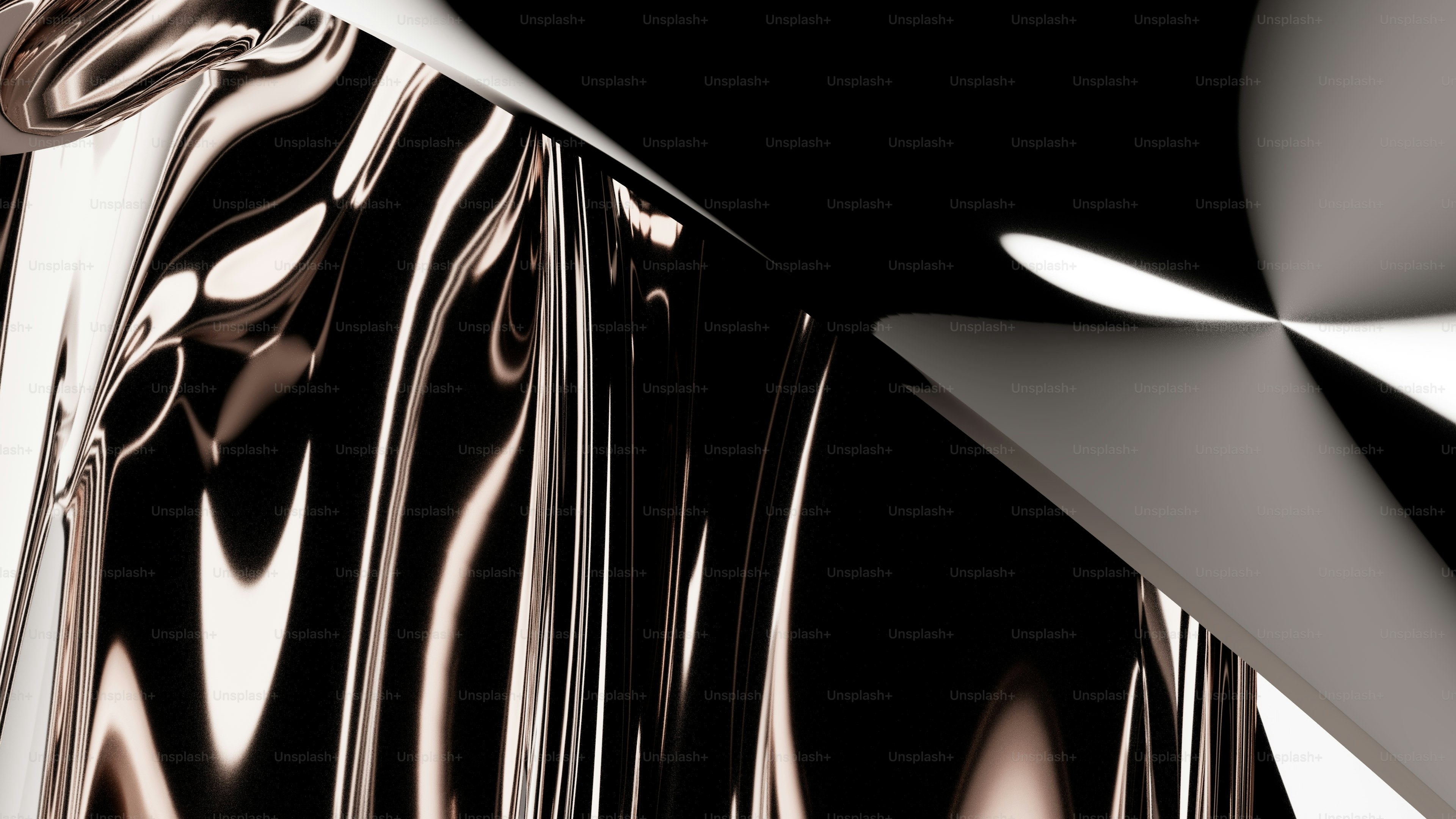 A black and white photo of a shiny object photo – Fluid Image on Unsplash