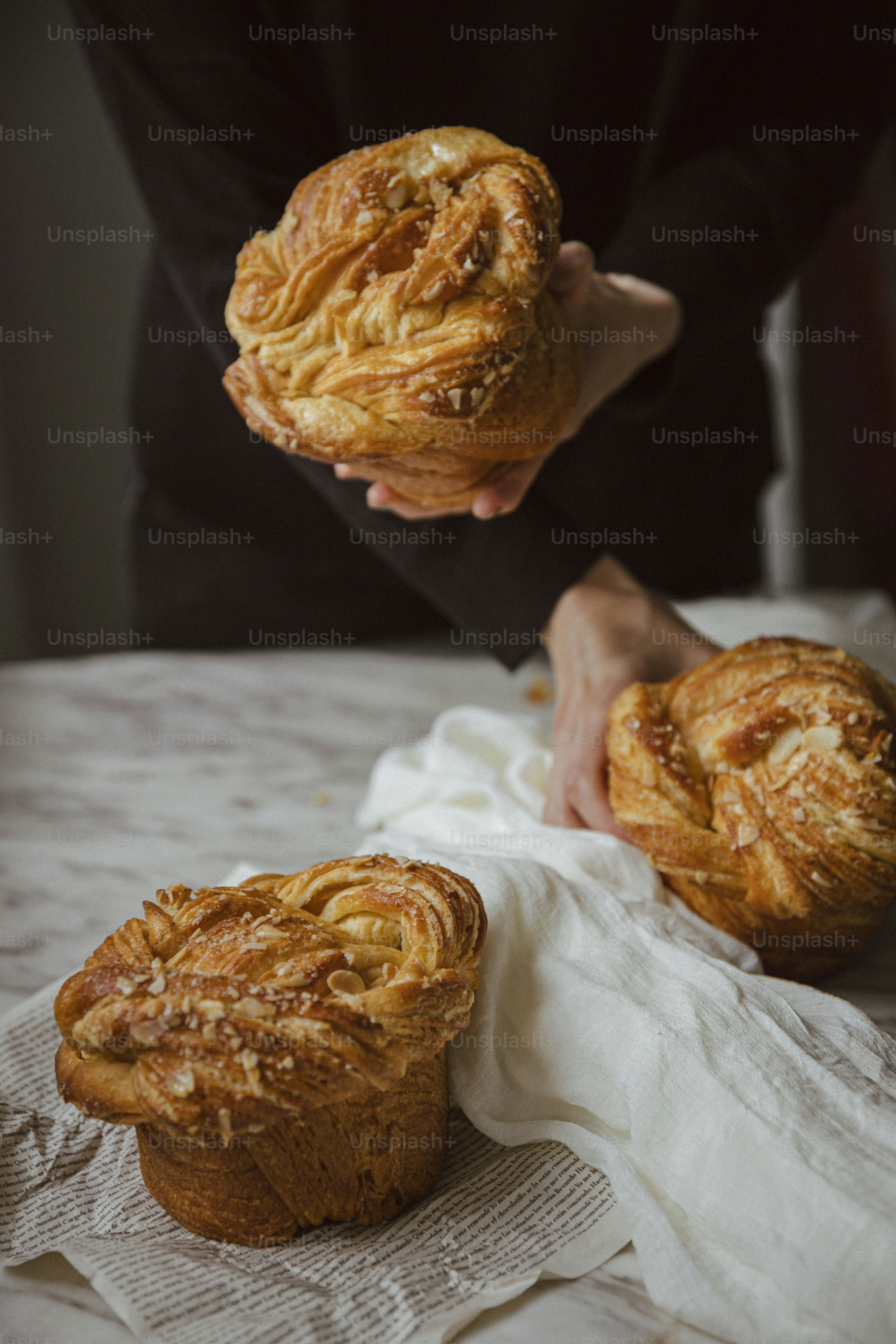 A person holding a pastry in their hands photo – Food Image on Unsplash