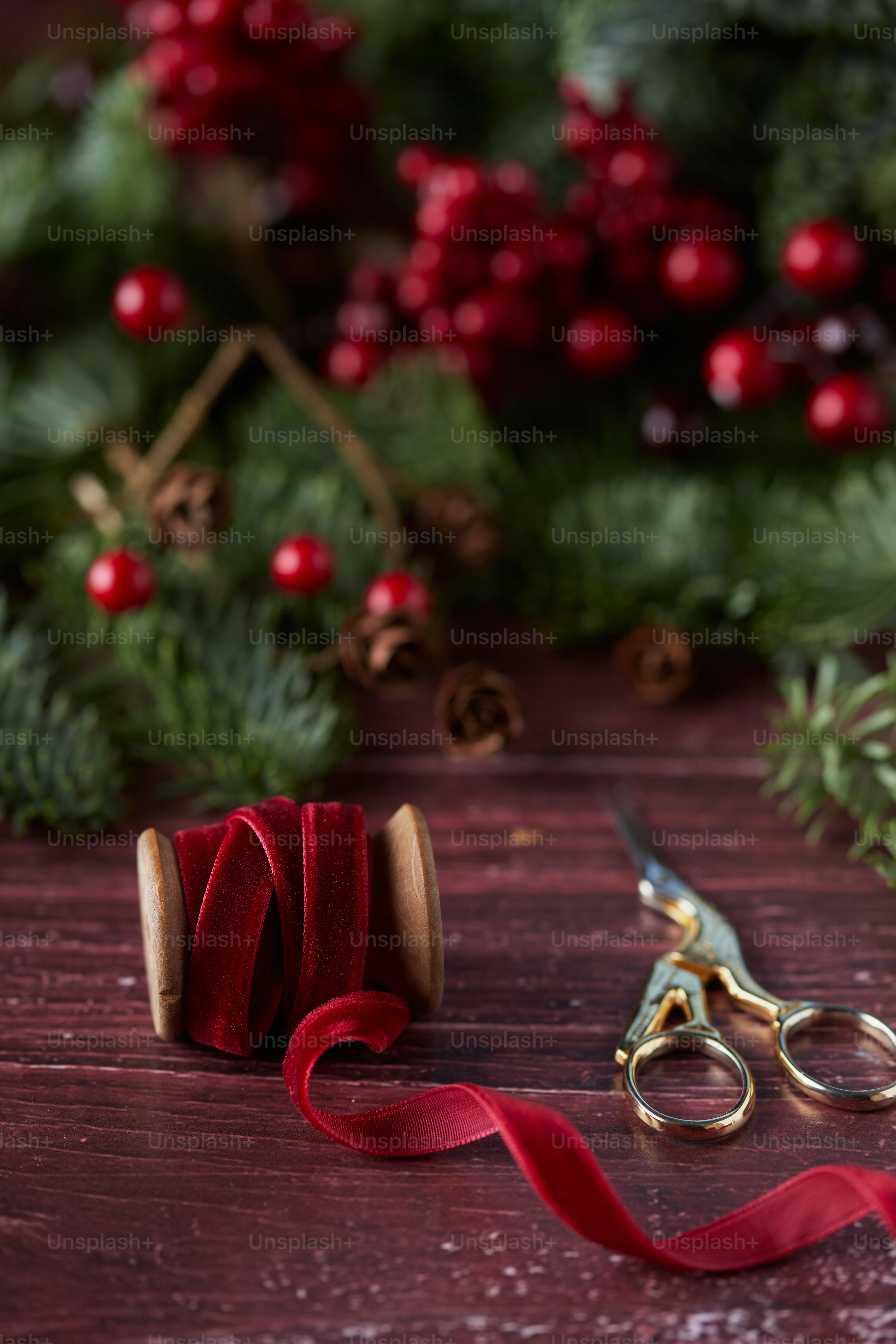 A pair of scissors sitting on top of a wooden table photo – Scissors ...