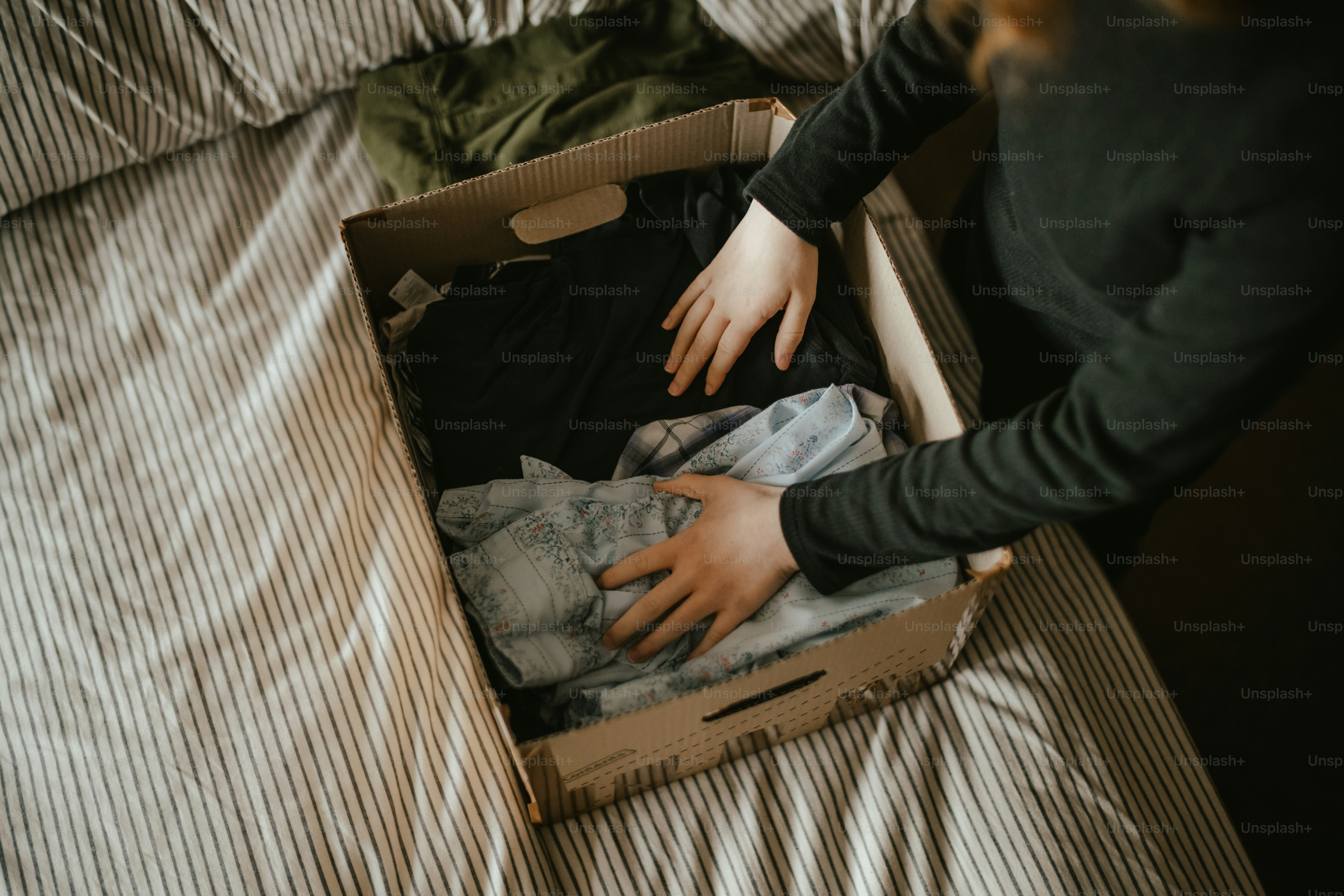 A person in a box photo – Recycling Image on Unsplash