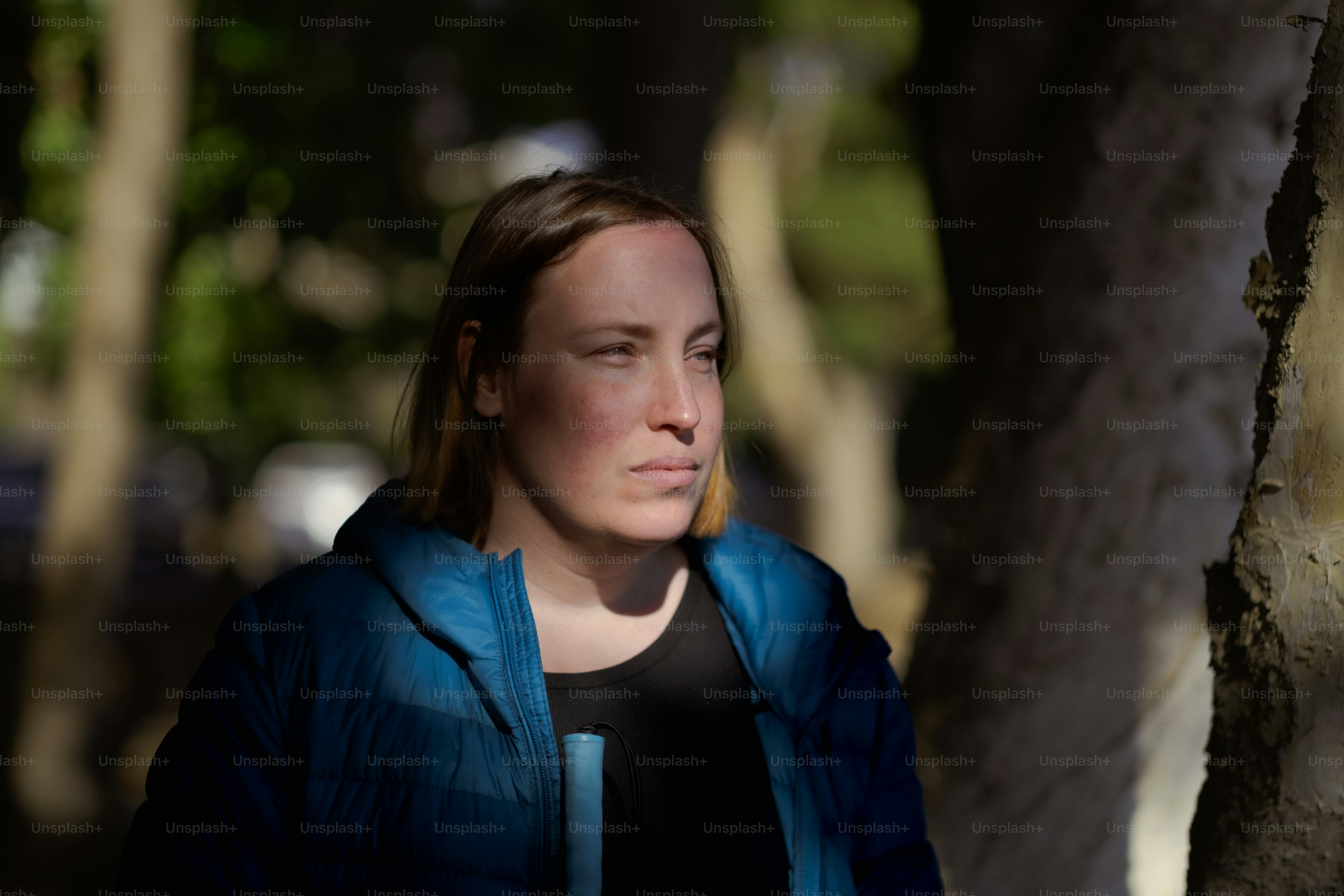 A person in a blue jacket photo – Portrait Image on Unsplash