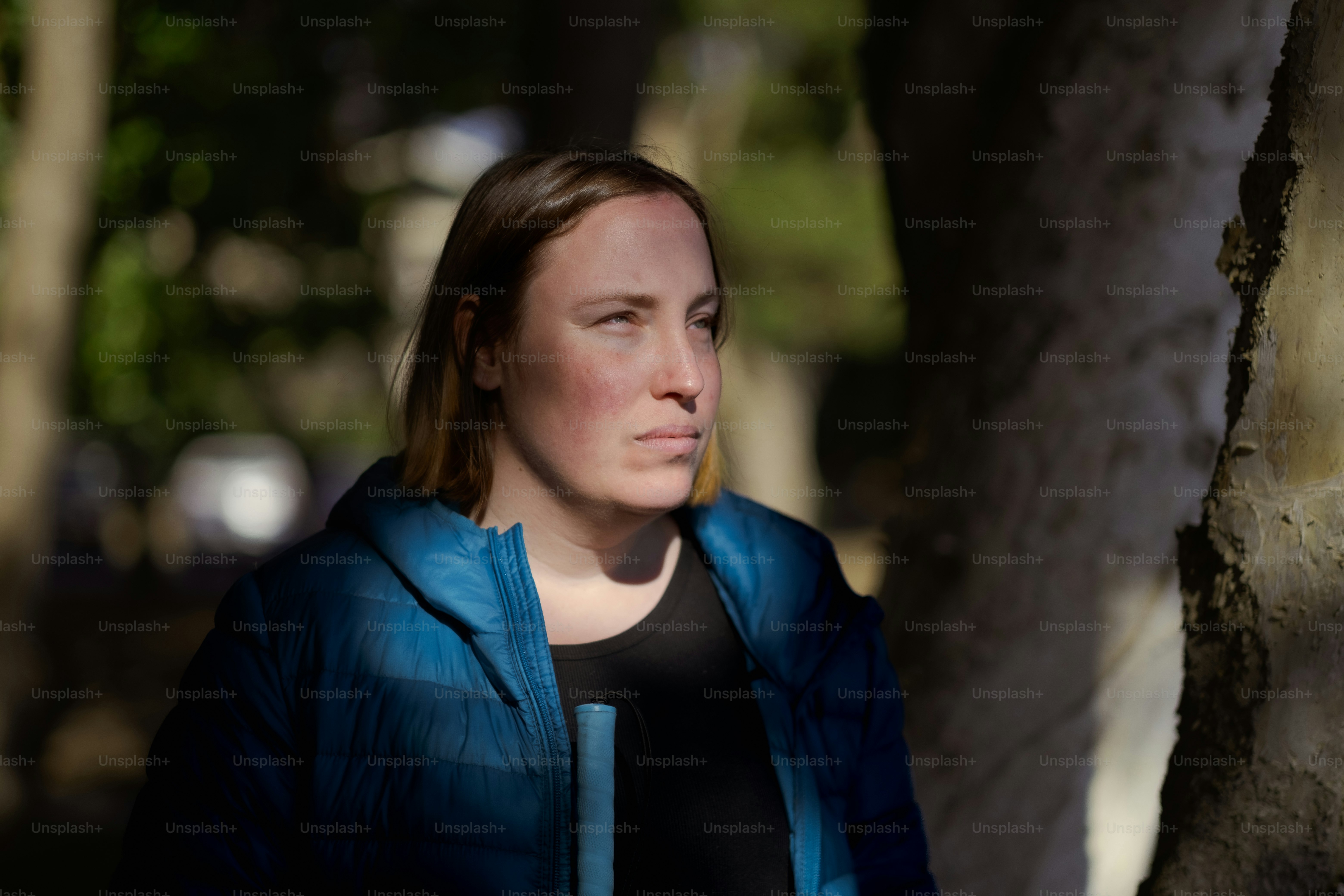 A person in a blue jacket photo – Portrait Image on Unsplash