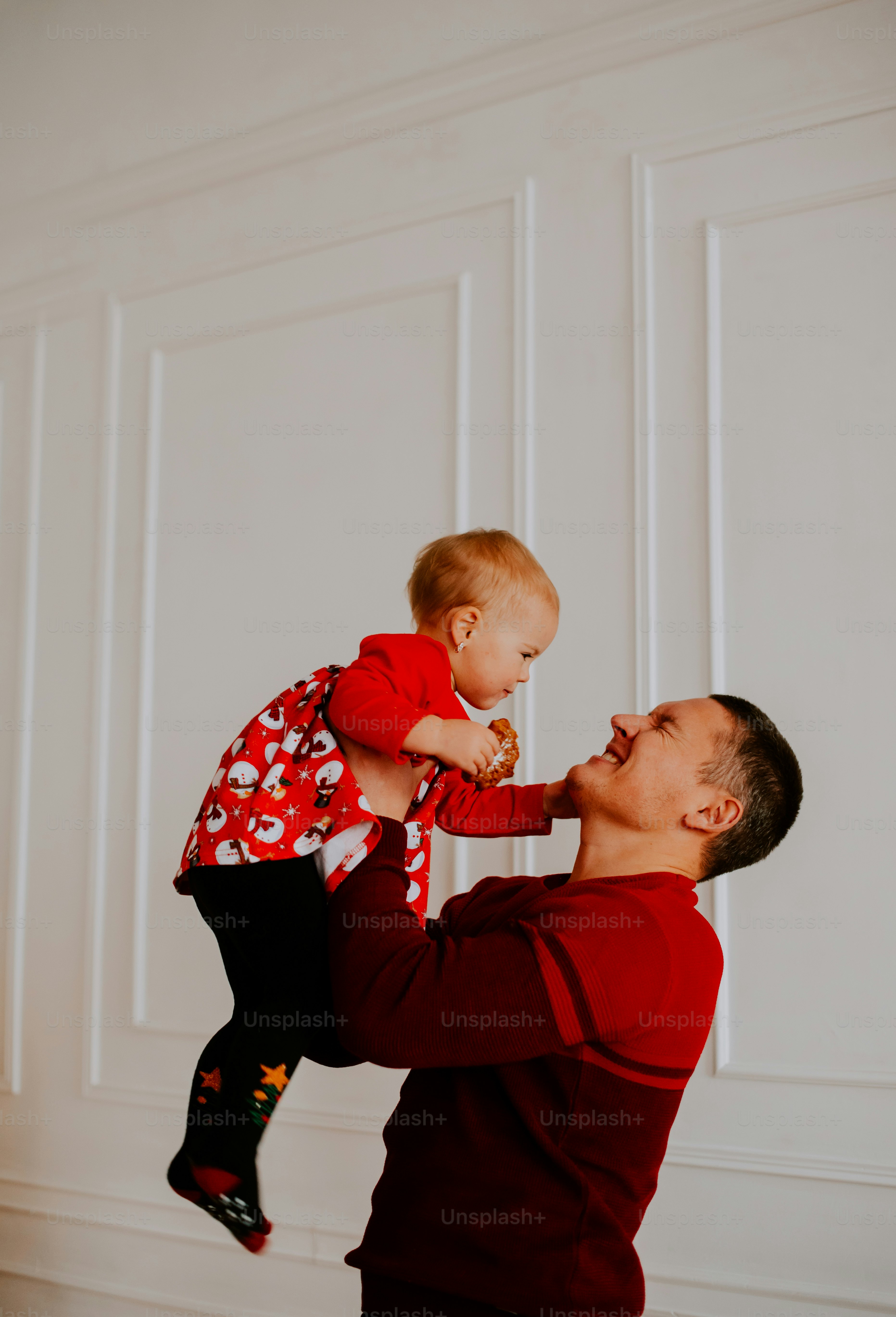 A person holding a baby photo – People Image on Unsplash