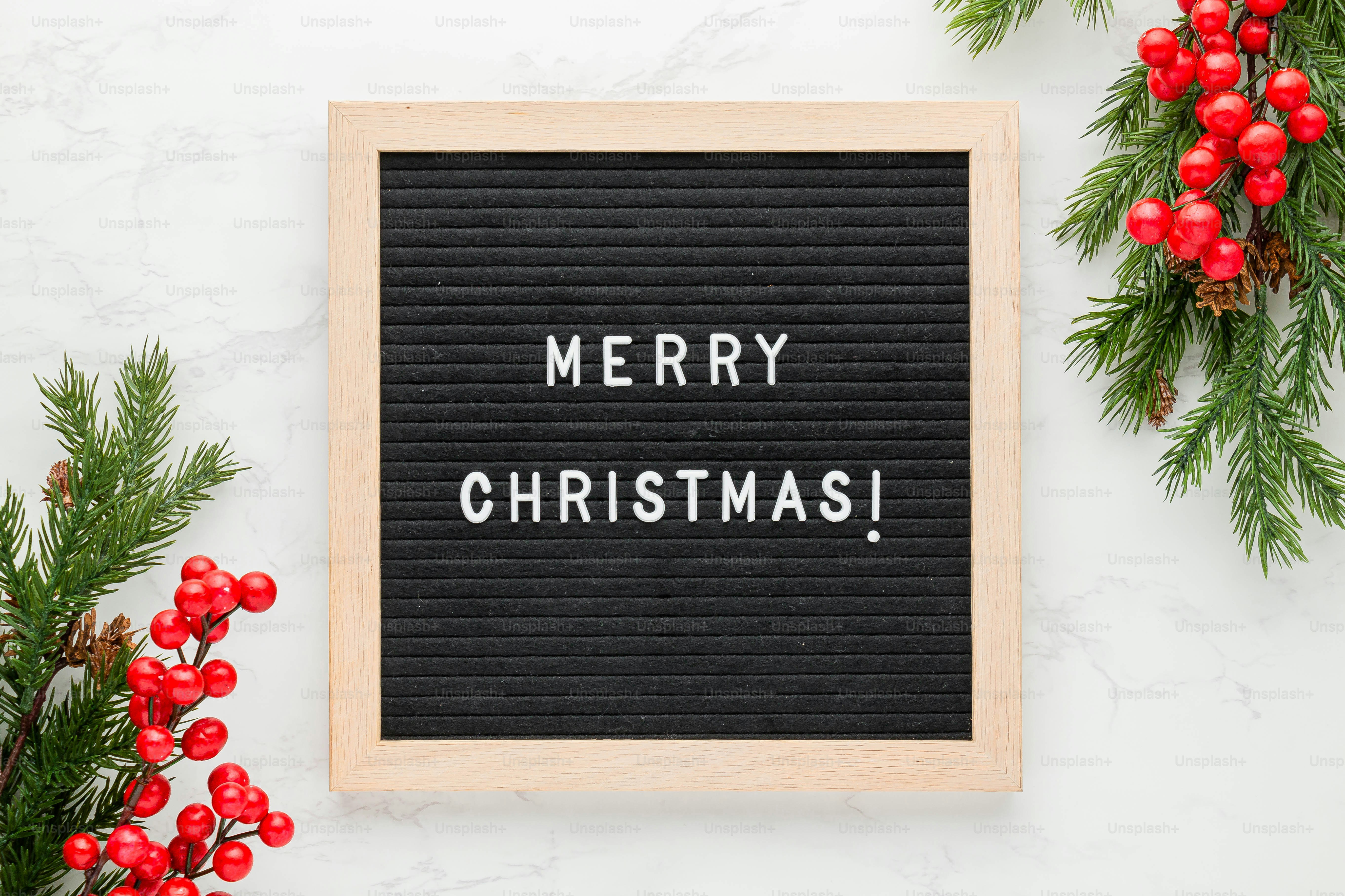 A black frame with red berries photo – Merry christmas and happy new ...