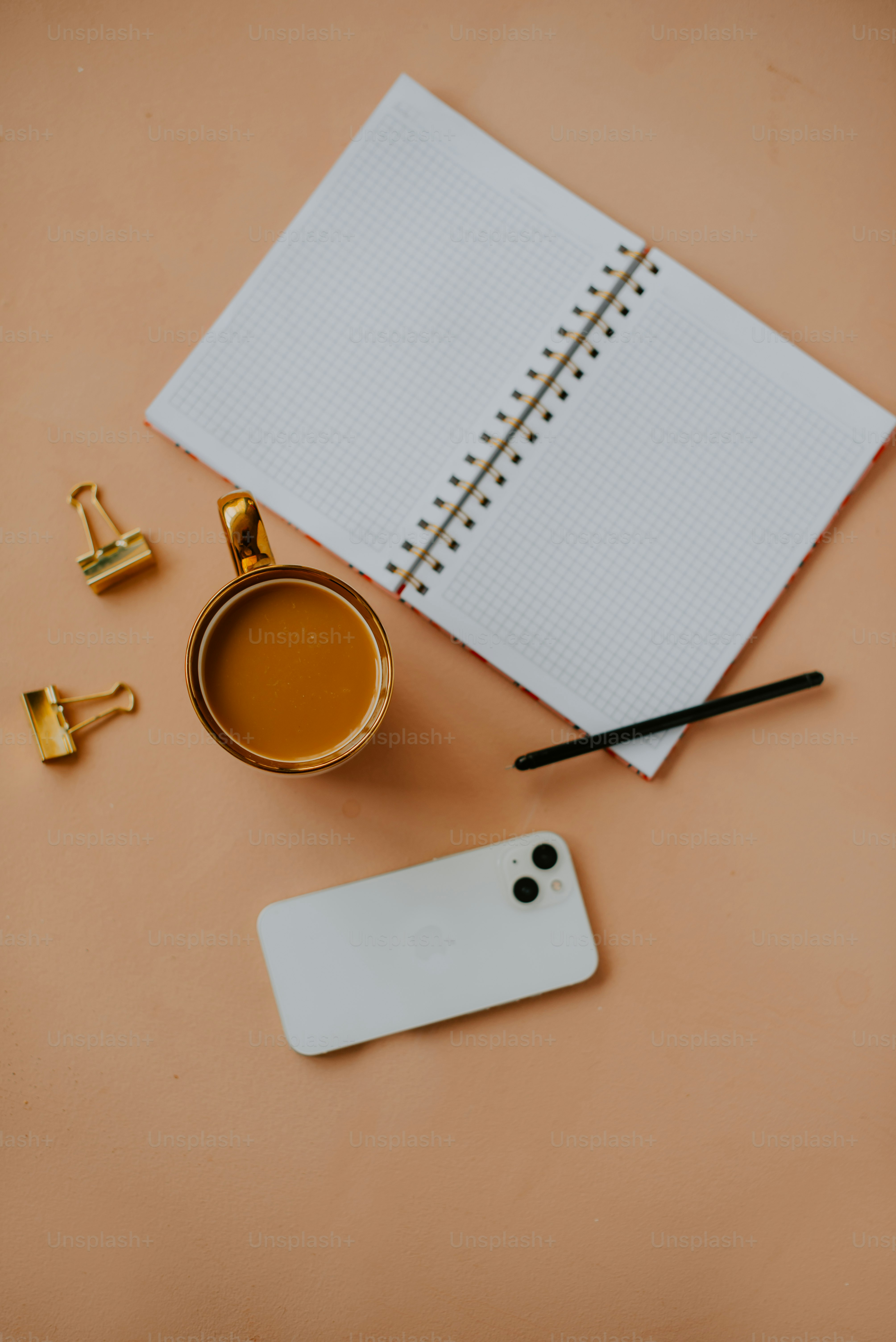 A pen and a paper on a table photo – Coffee Image on Unsplash
