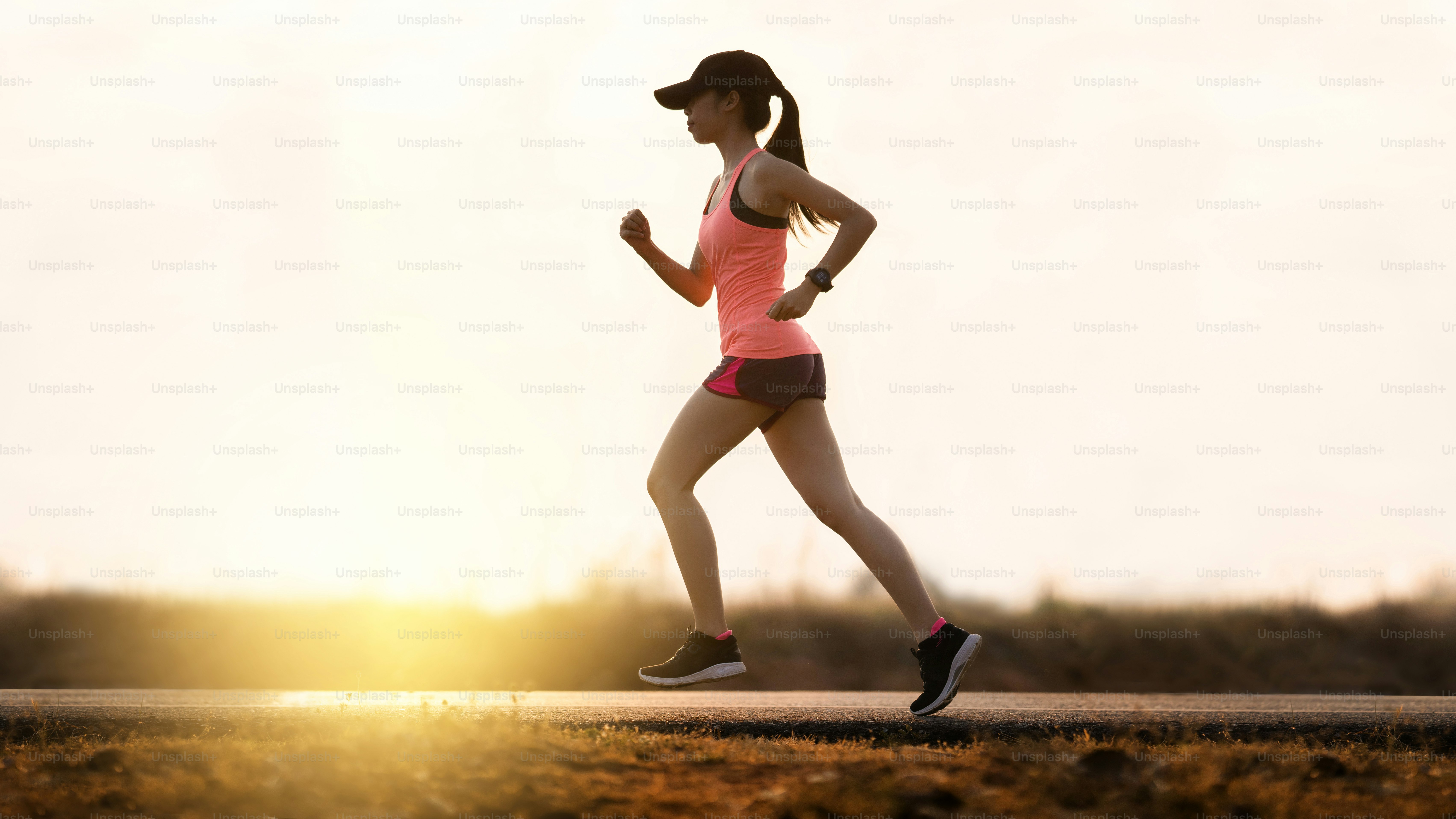 Asian woman runners she was running on the road in the morning. photo ...