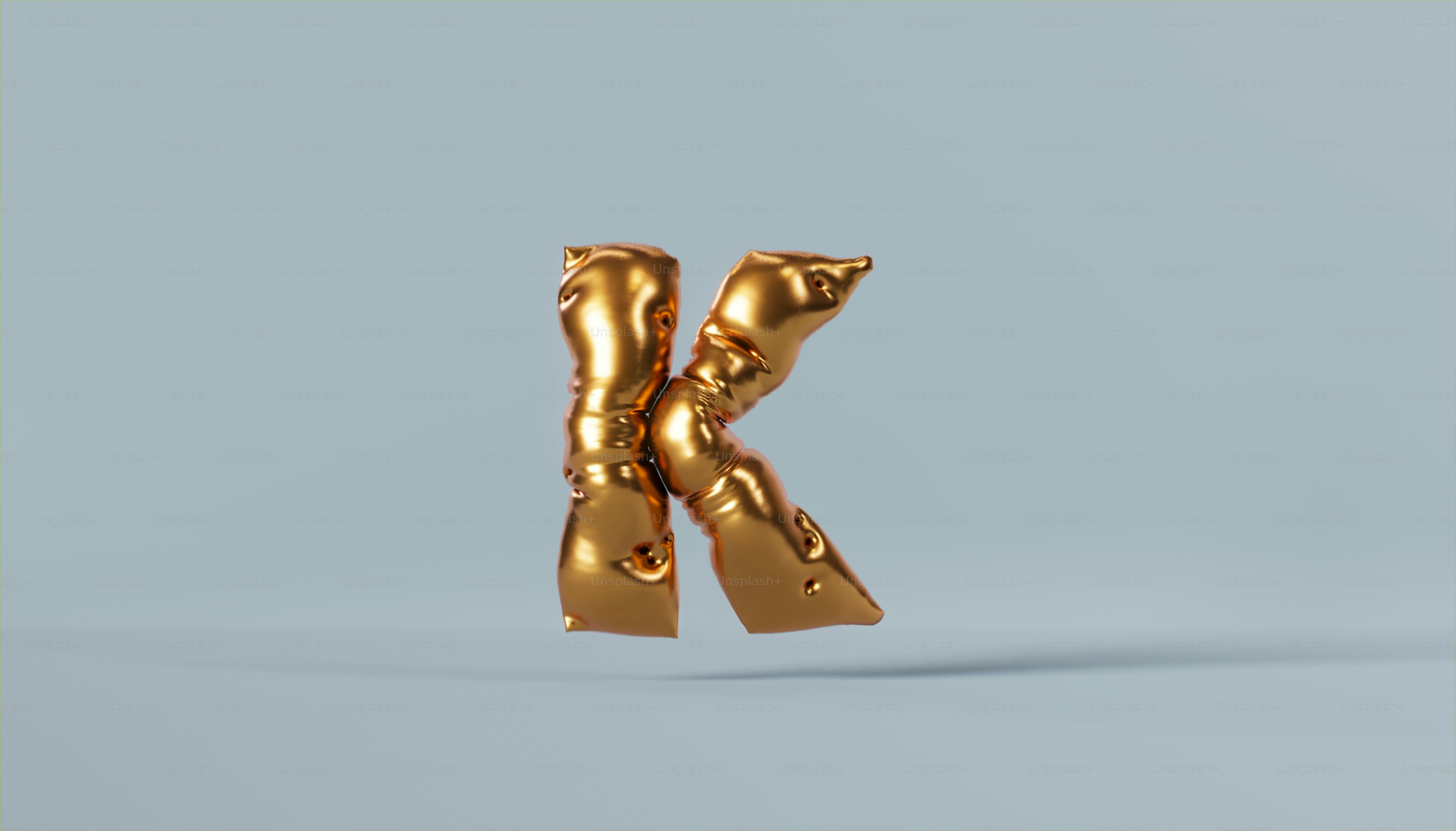 A pair of gold and silver statues photo – Celebrations Image on Unsplash