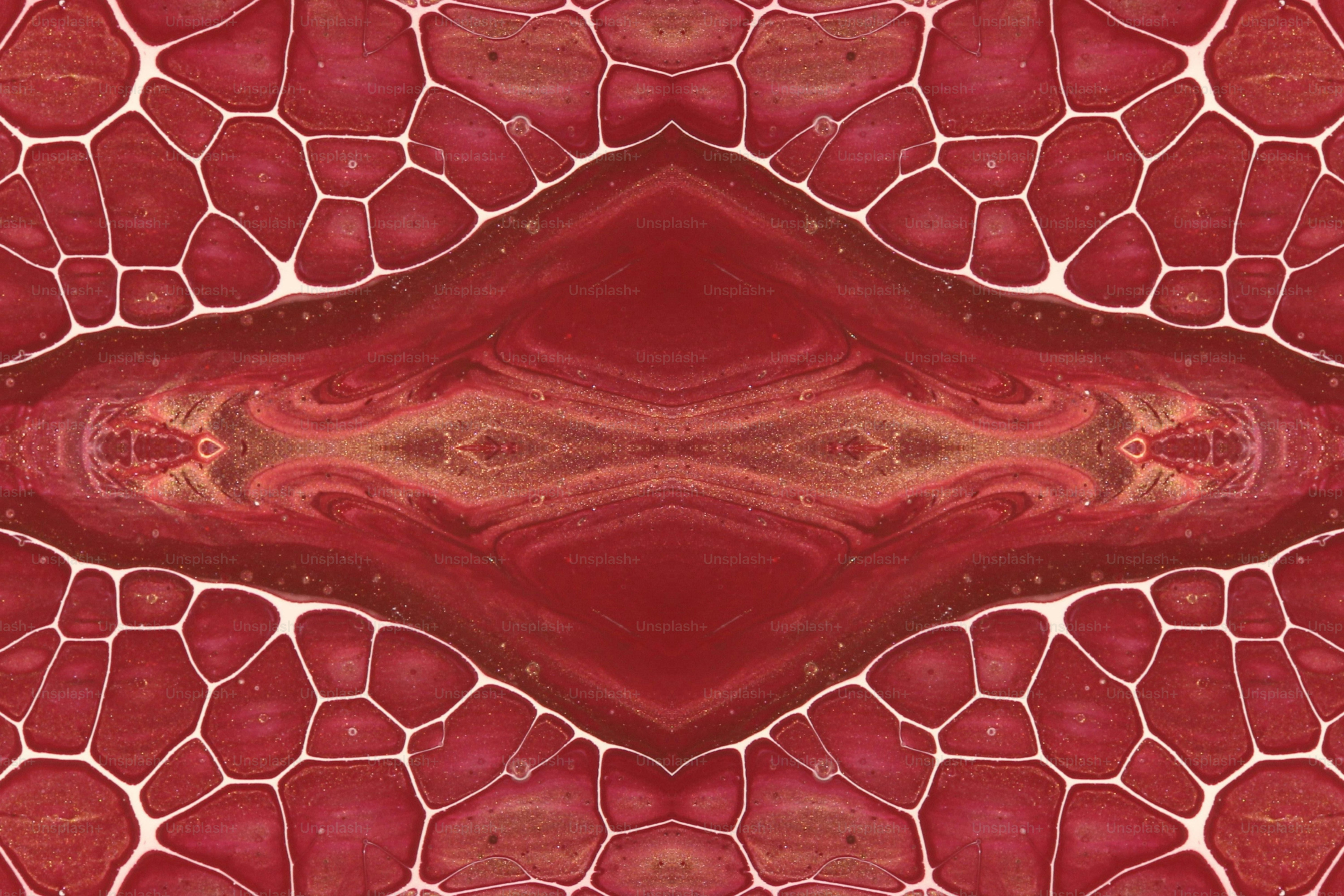 Une surface à motifs rouges et noirs photo – Fonds d'écran Photo sur ...