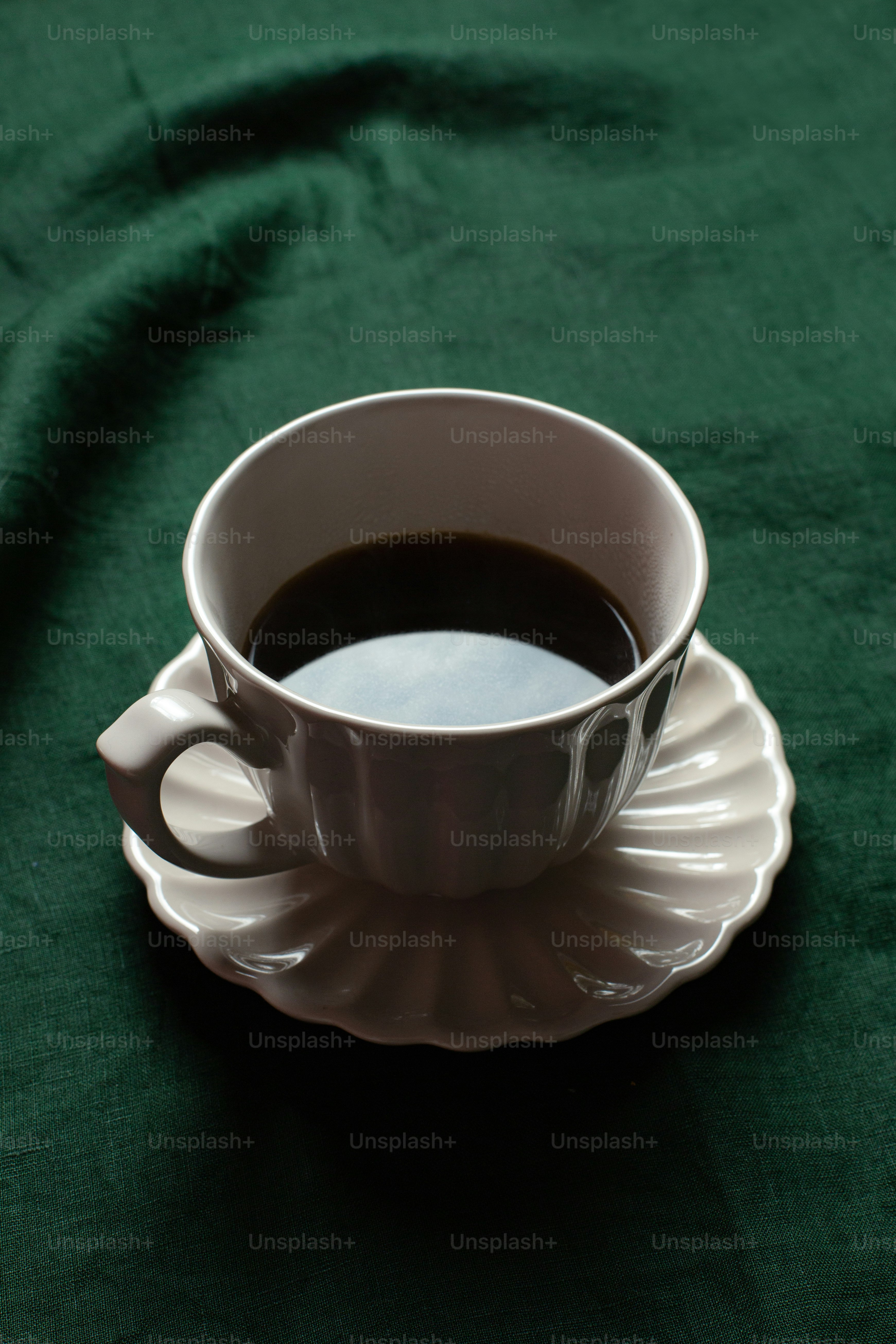 A cup of coffee on a saucer photo – Cup of coffee Image on Unsplash