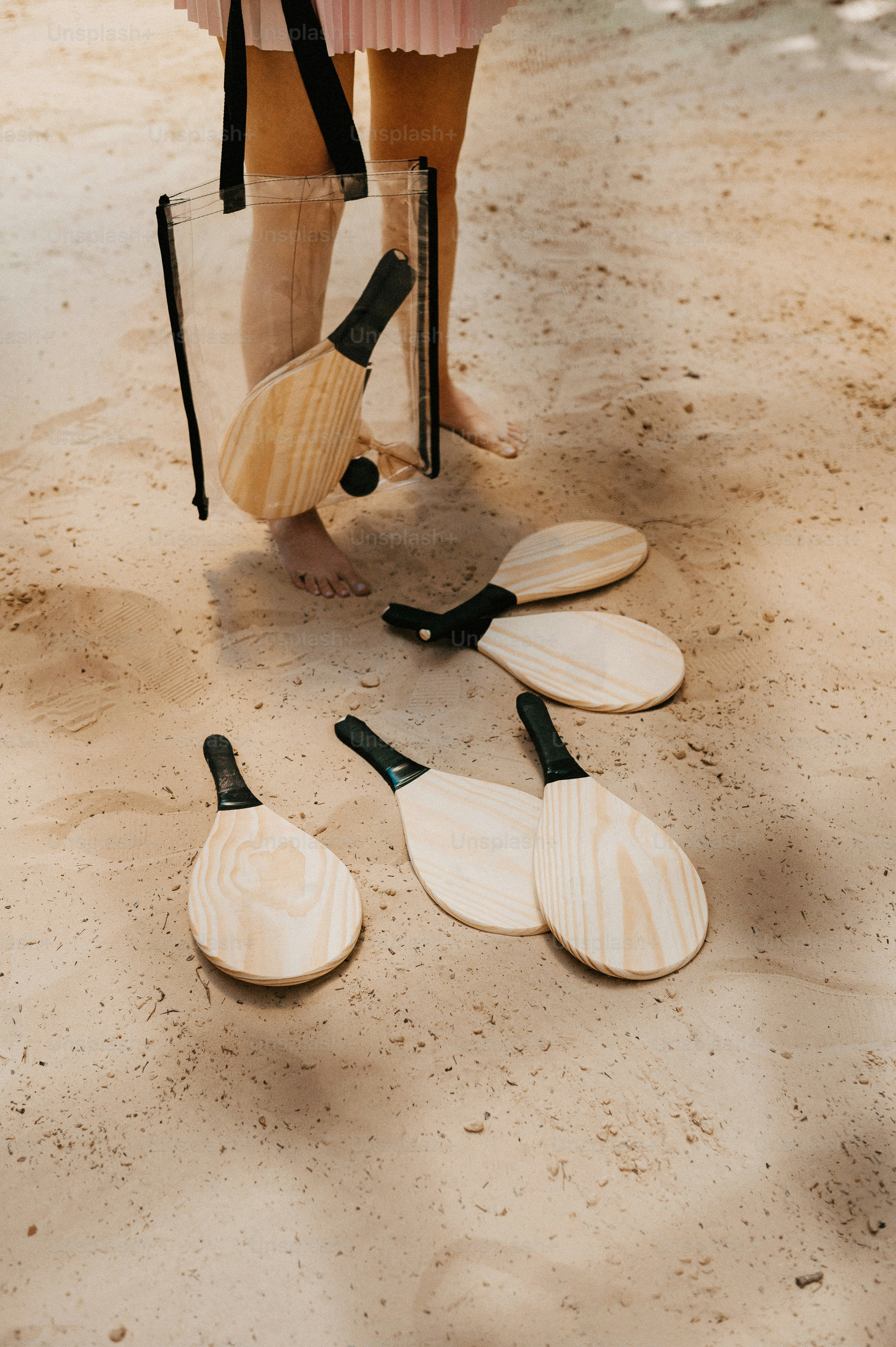 A group of sandals on the sand photo – Sport Image on Unsplash