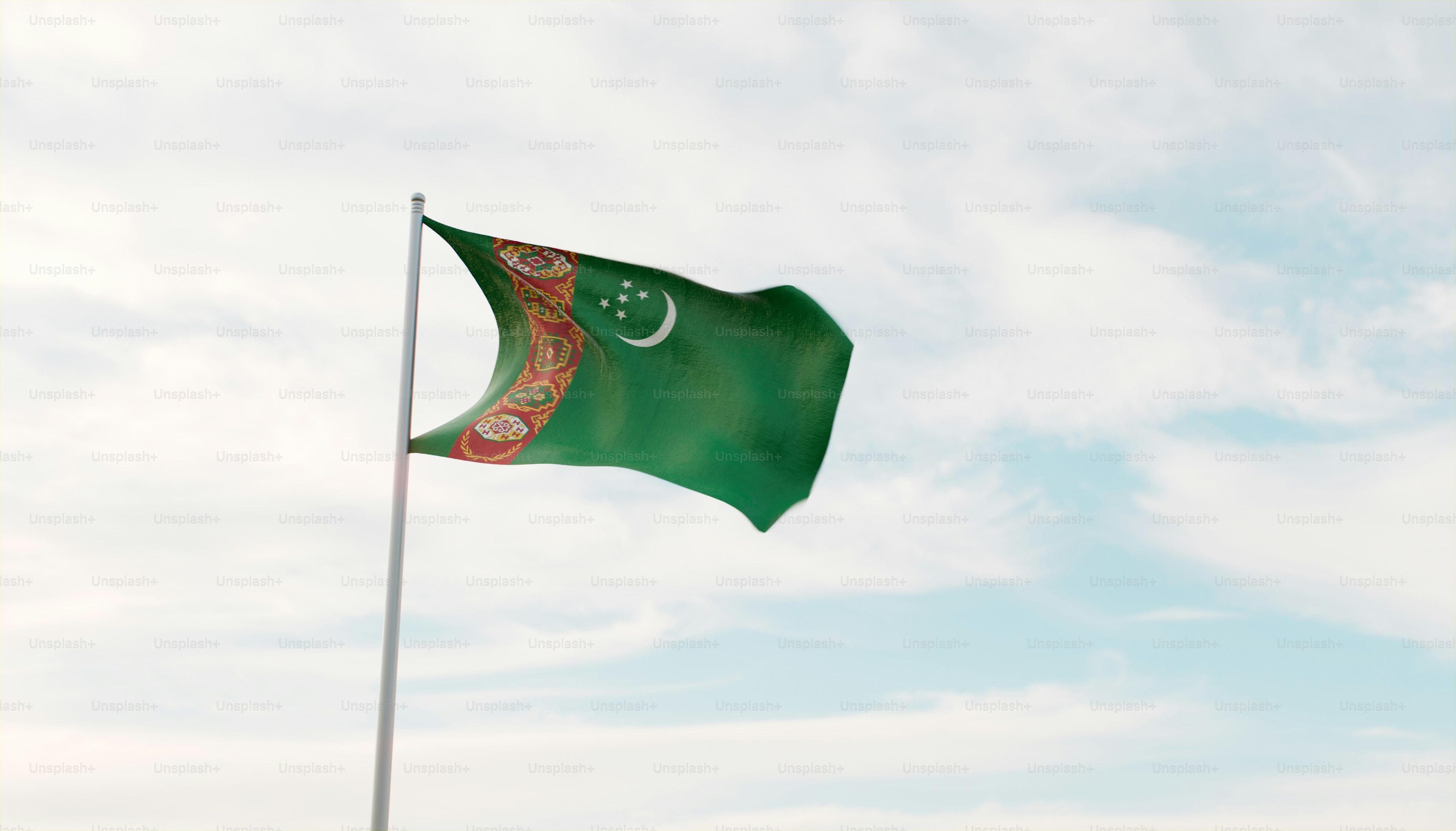 A green flag flying in the wind on a cloudy day photo – Turkmenistan ...