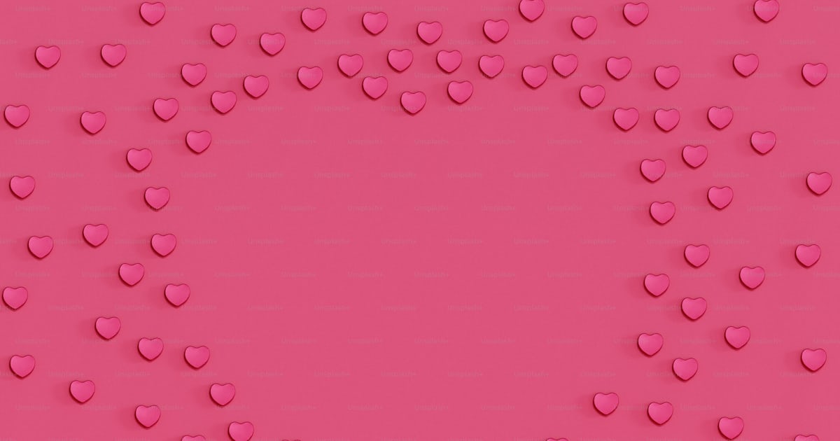 ピンクの背景にハートがたくさん描かれていますの写真 Unsplashの与えるの画像