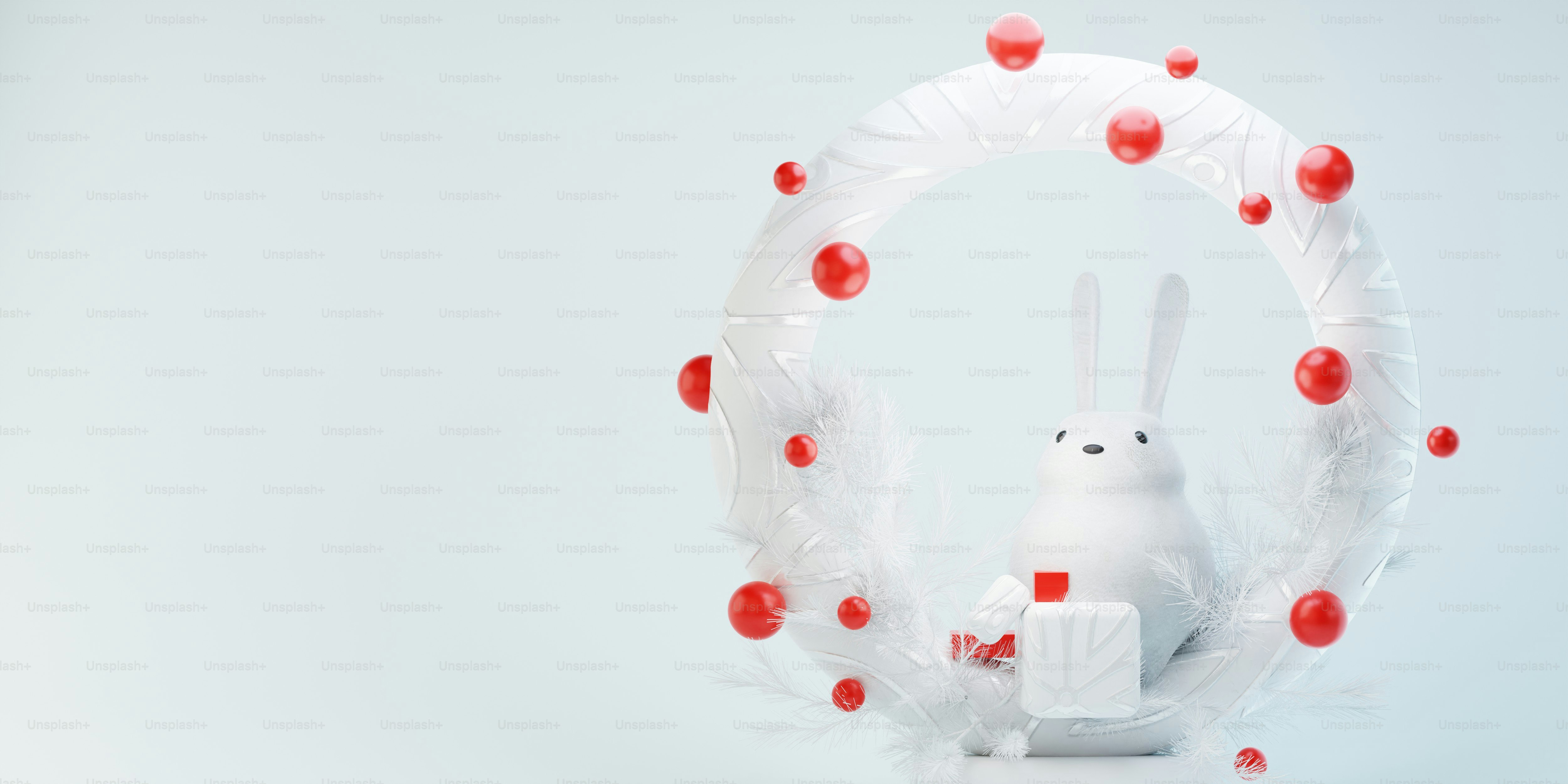 A white rabbit sitting in a circle with red balls around it photo – New ...