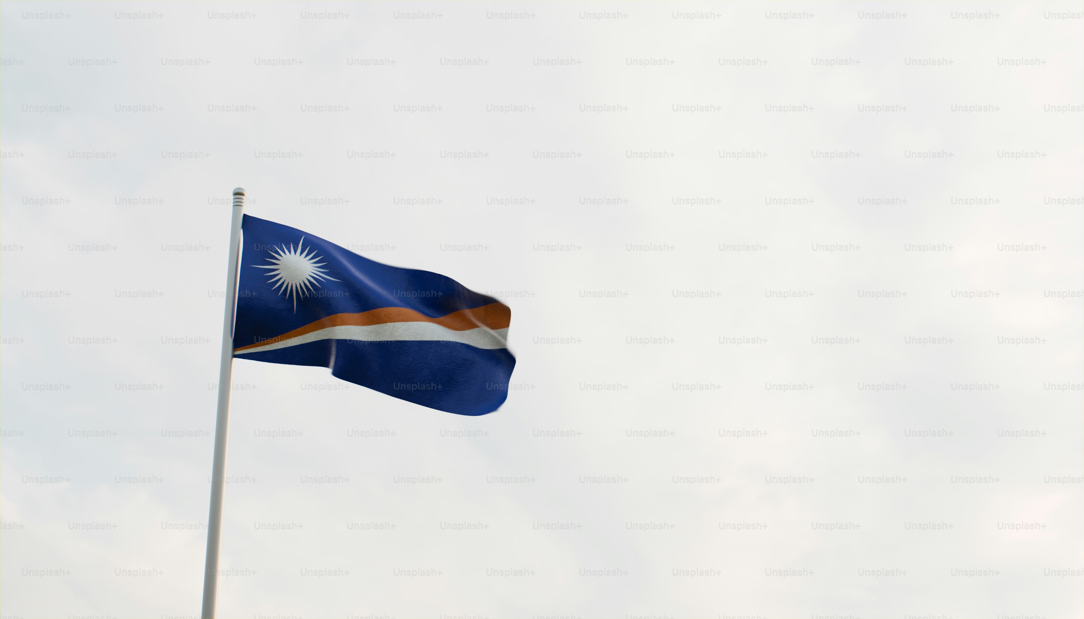 A blue and white flag flying in the sky photo – Marshallese Image on ...