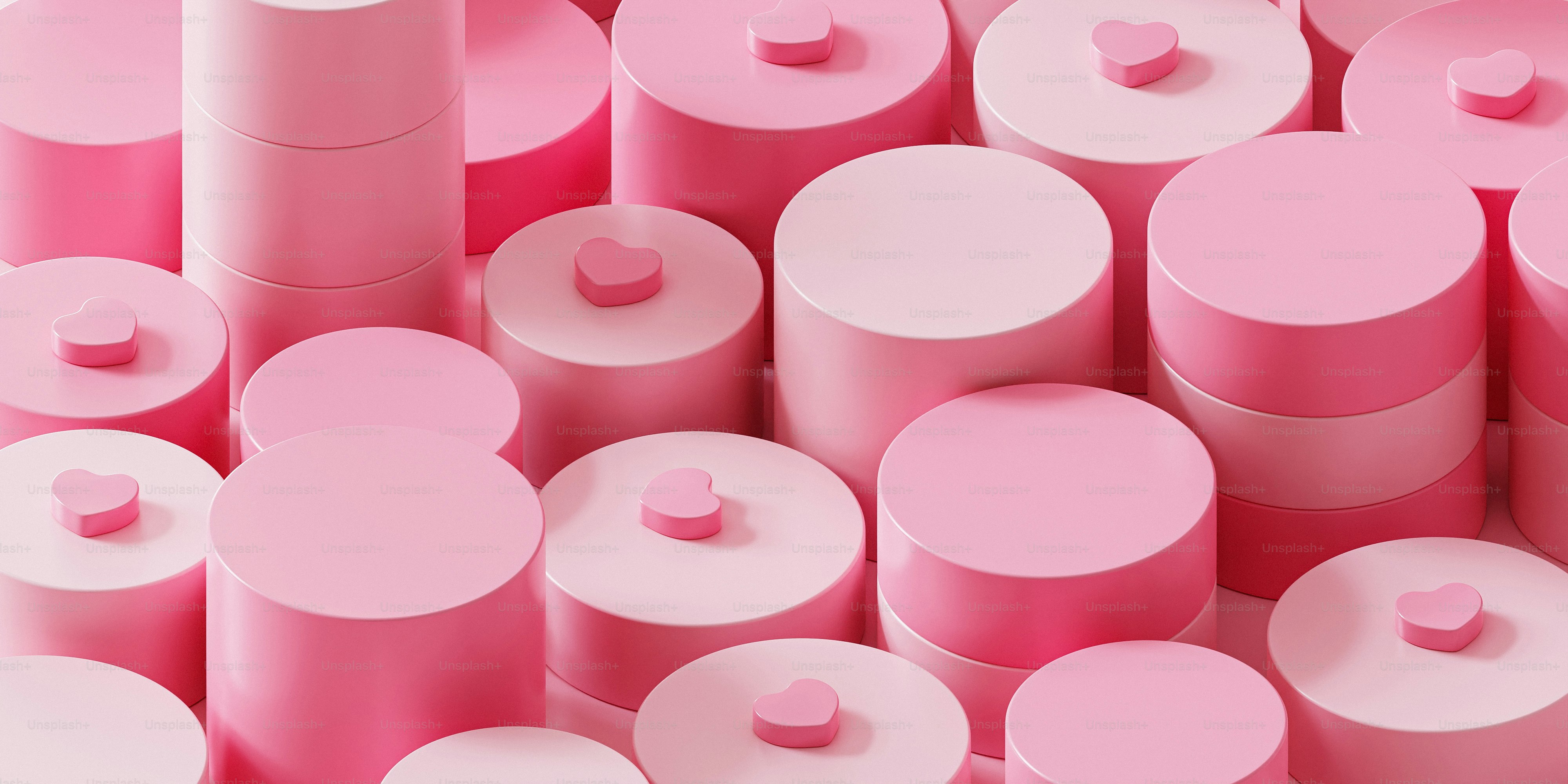 A large group of pink cylinders with hearts on them photo – Background ...