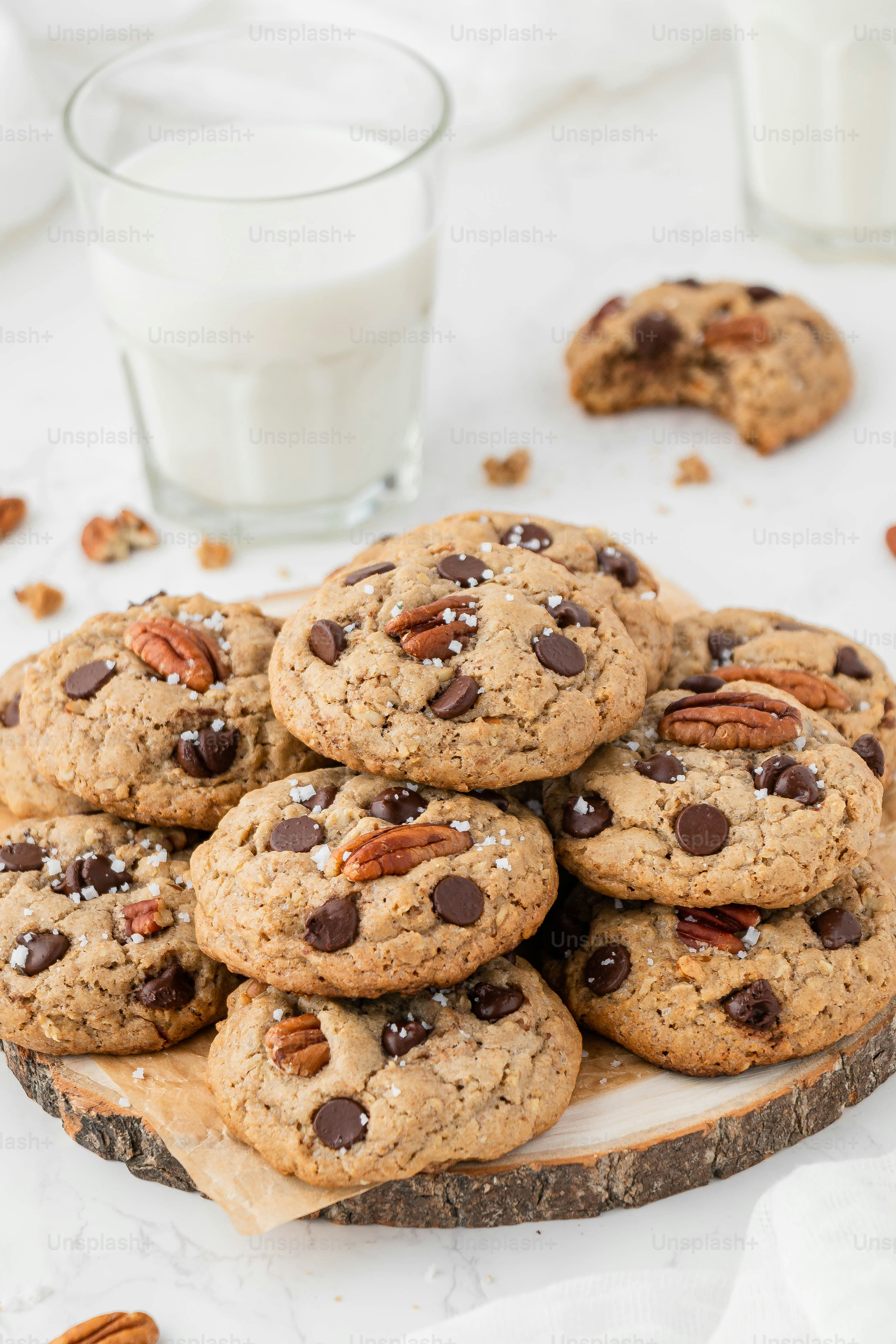 A stack of cookies sitting on top of a white plate photo – Cookies ...