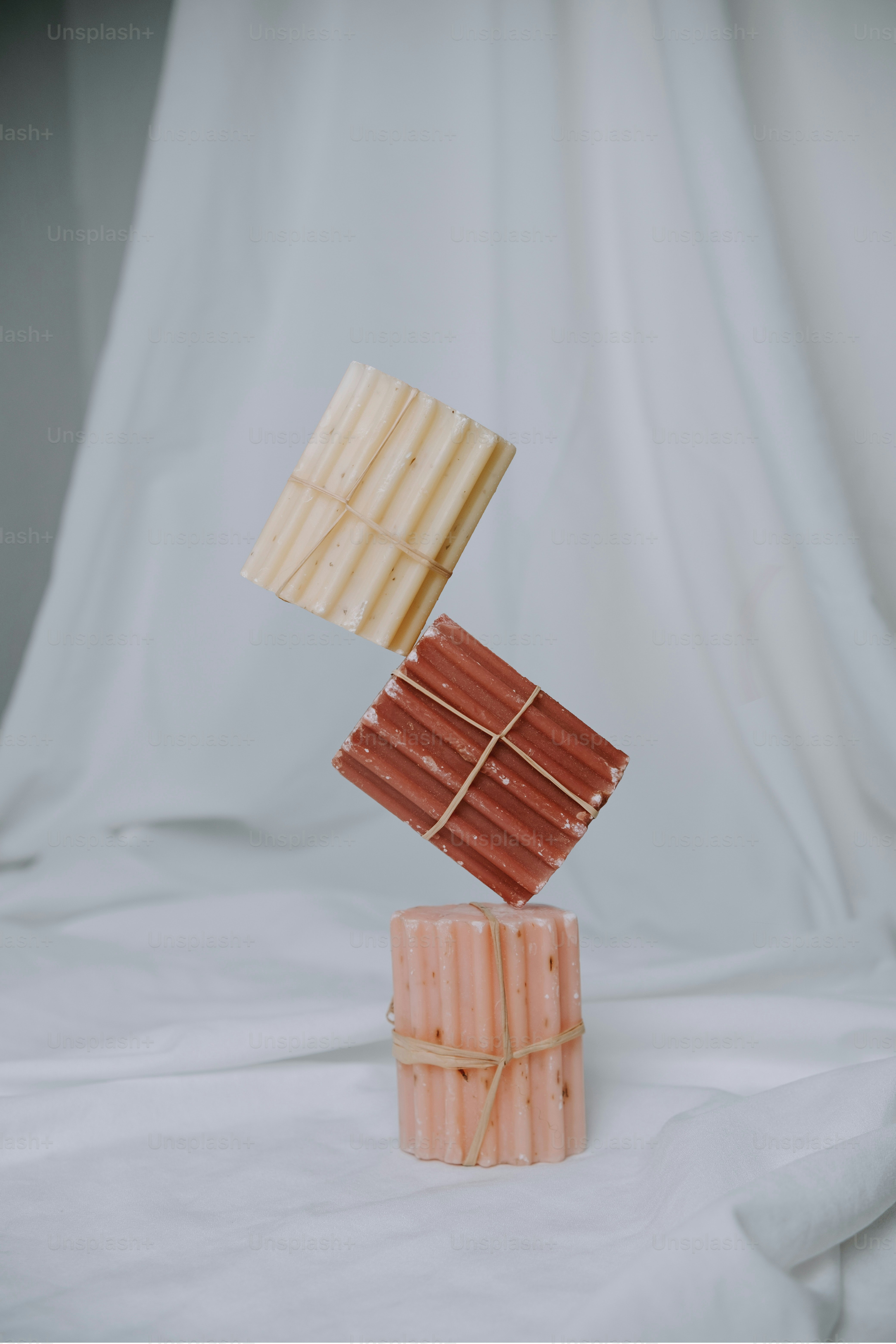 A stack of sticks sitting on top of each other photo – Wax Image on ...