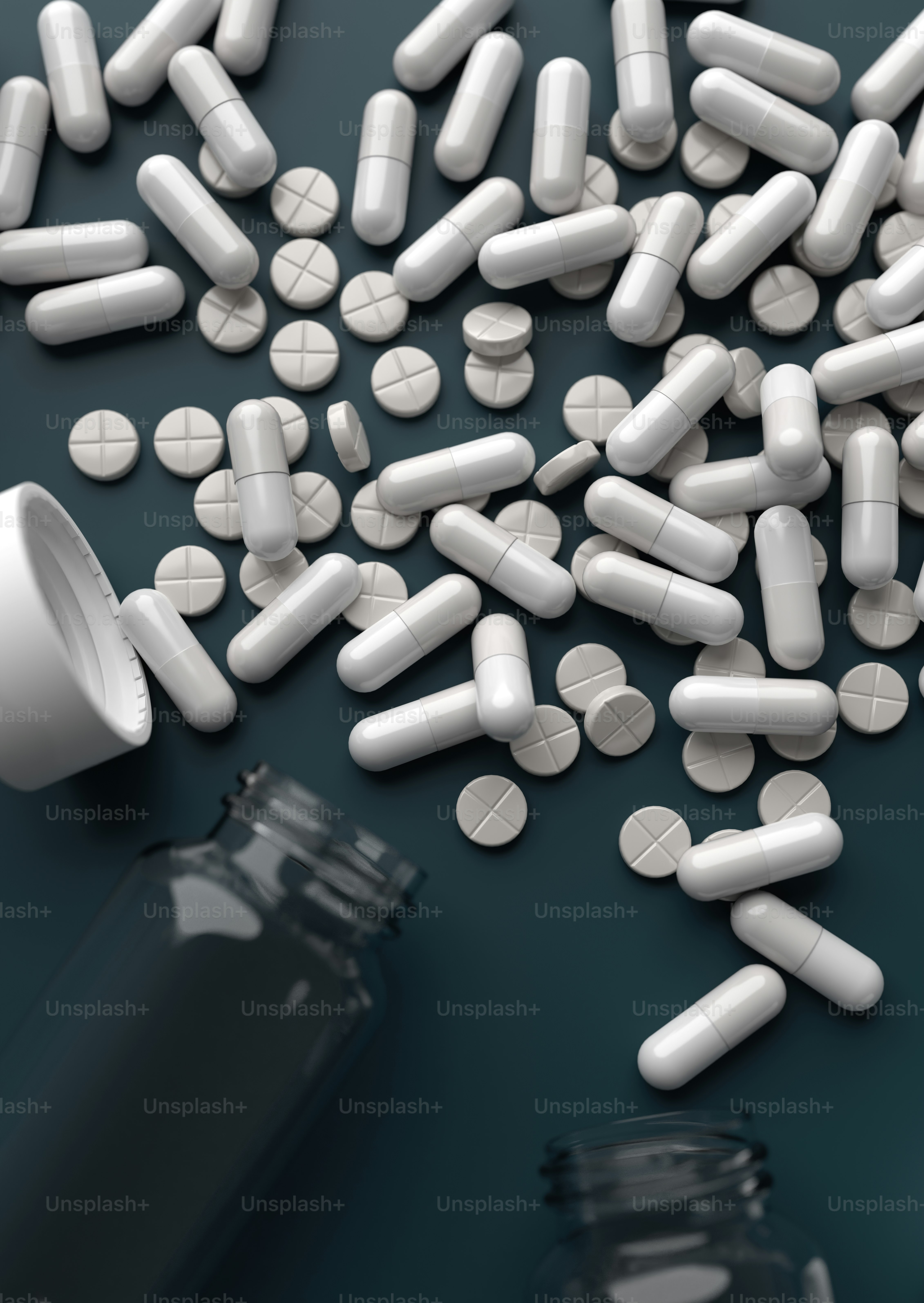 Pills spilling out of a bottle onto a table photo – Medication Image on ...