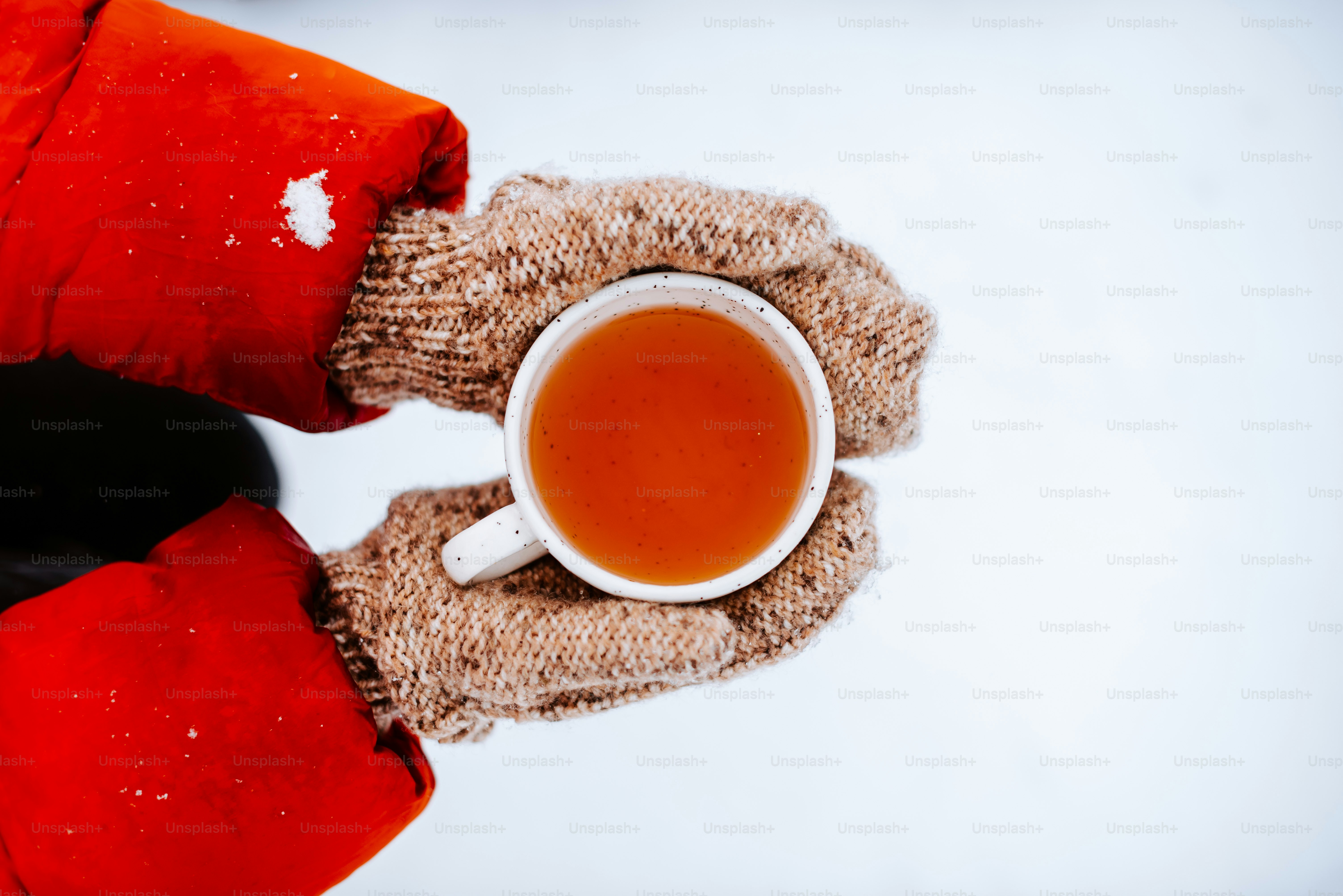 A cup of tea in a persons hand photo – Winter tea Image on Unsplash
